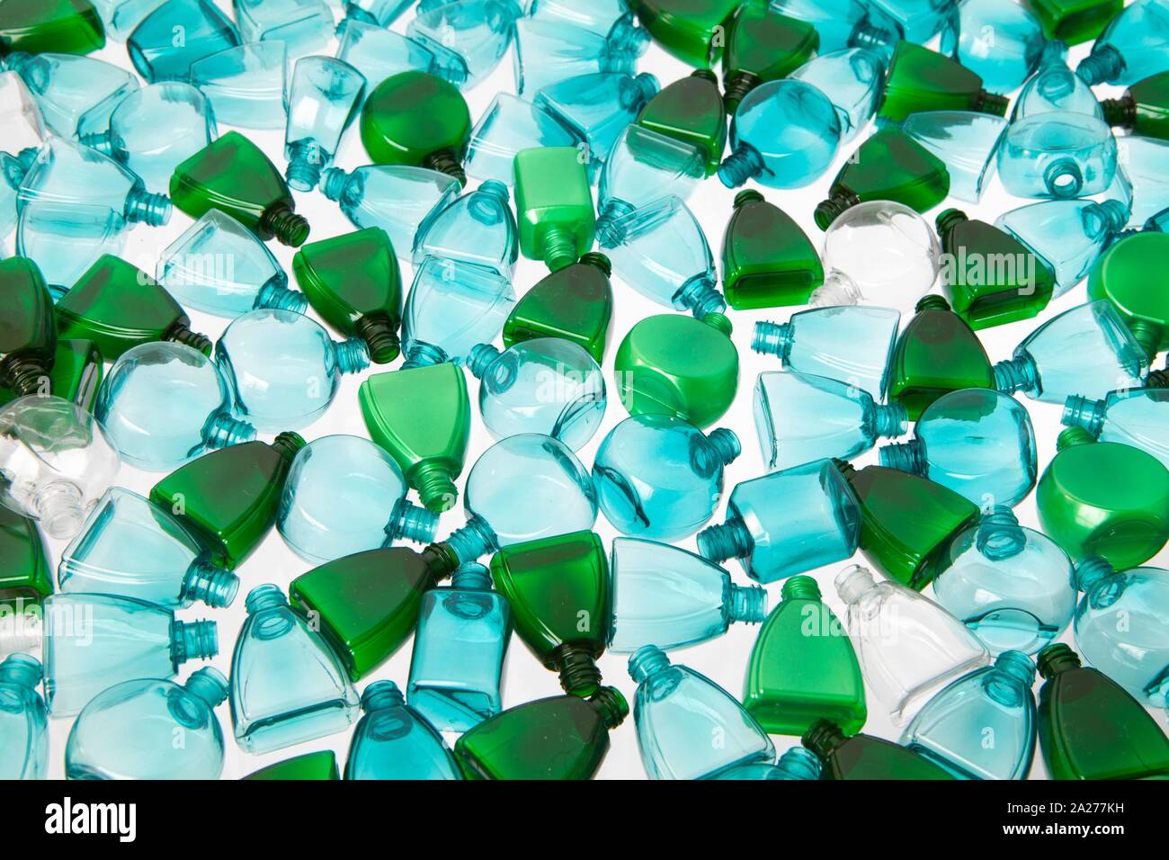 small colored plastic bottles scattered on translucent surface Stock ...
