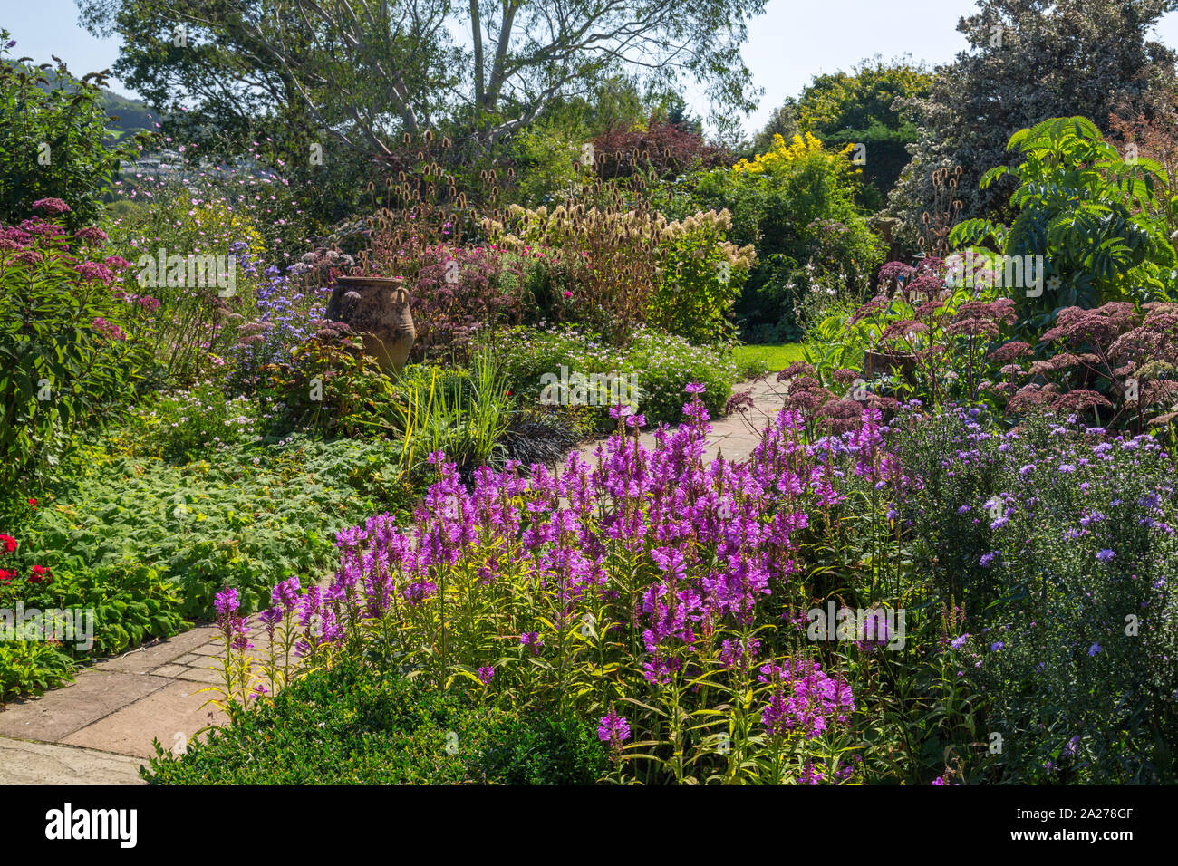The beds of the Rose Garden are filled with a colourful variety of ...