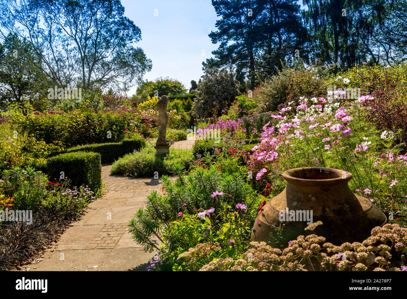 The beds of the Rose Garden are filled with a colourful variety of ...