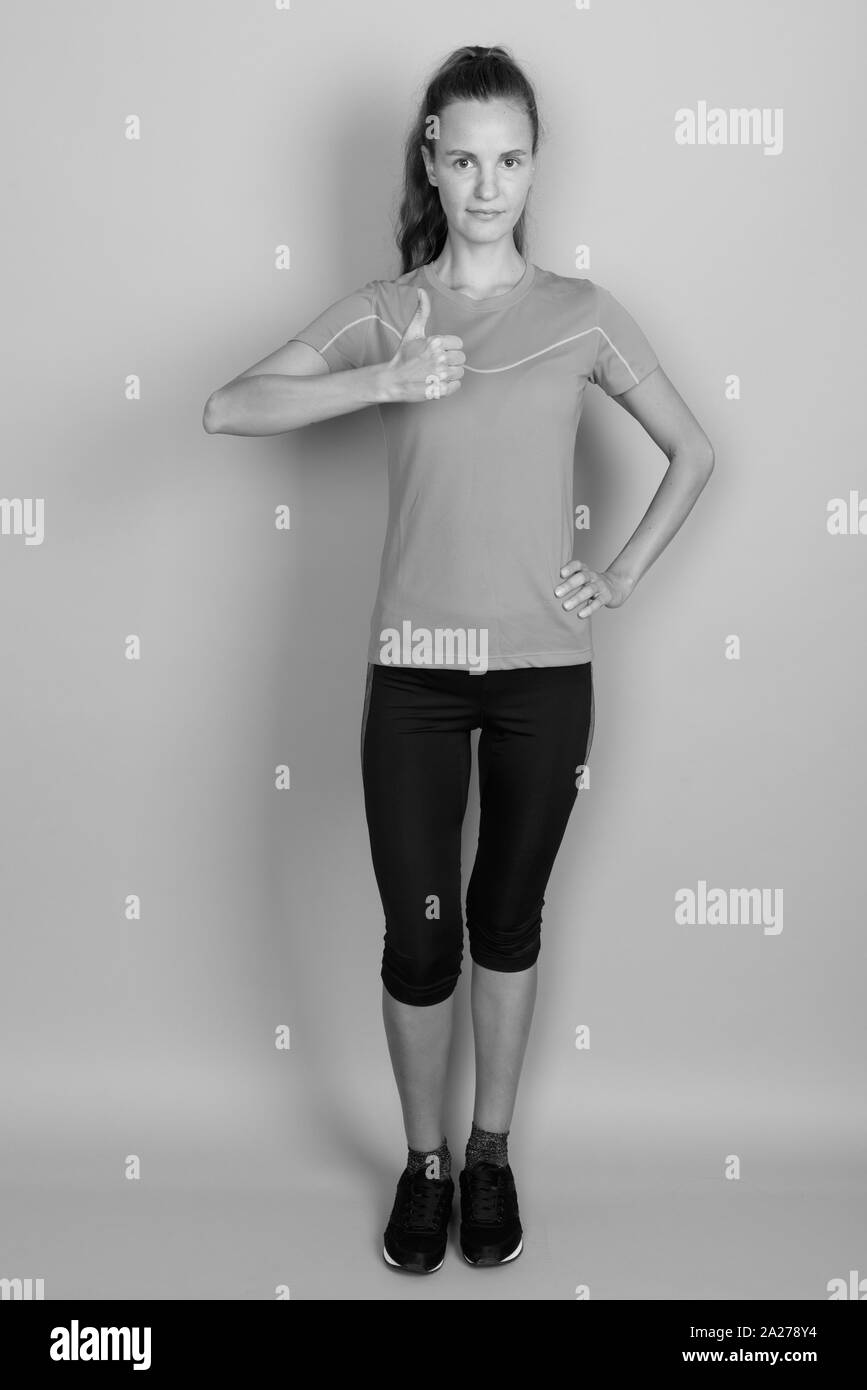 Full length portrait of woman ready for exercise and sport Stock Photo ...