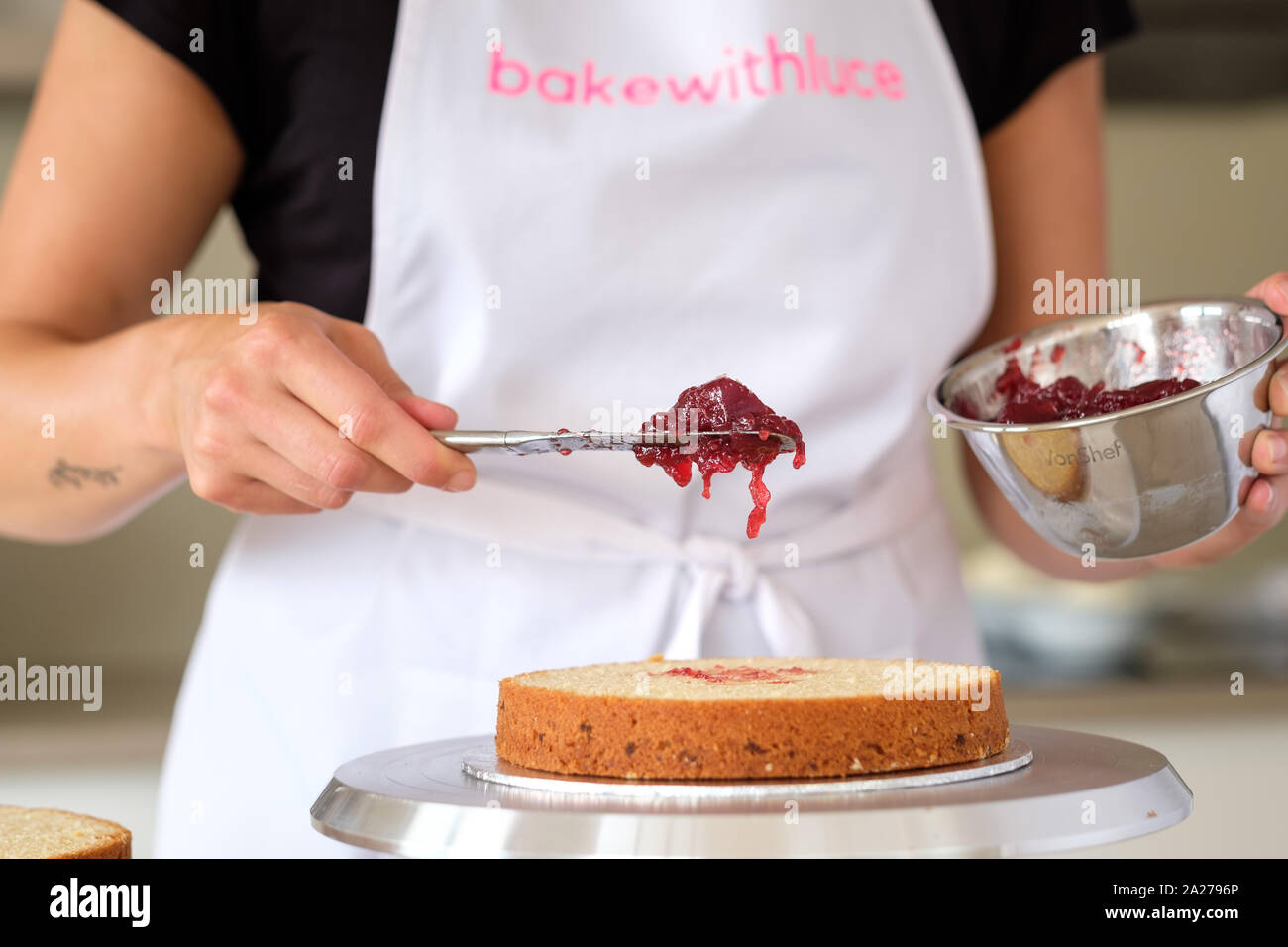 making and decorating a cake Stock Photo - Alamy