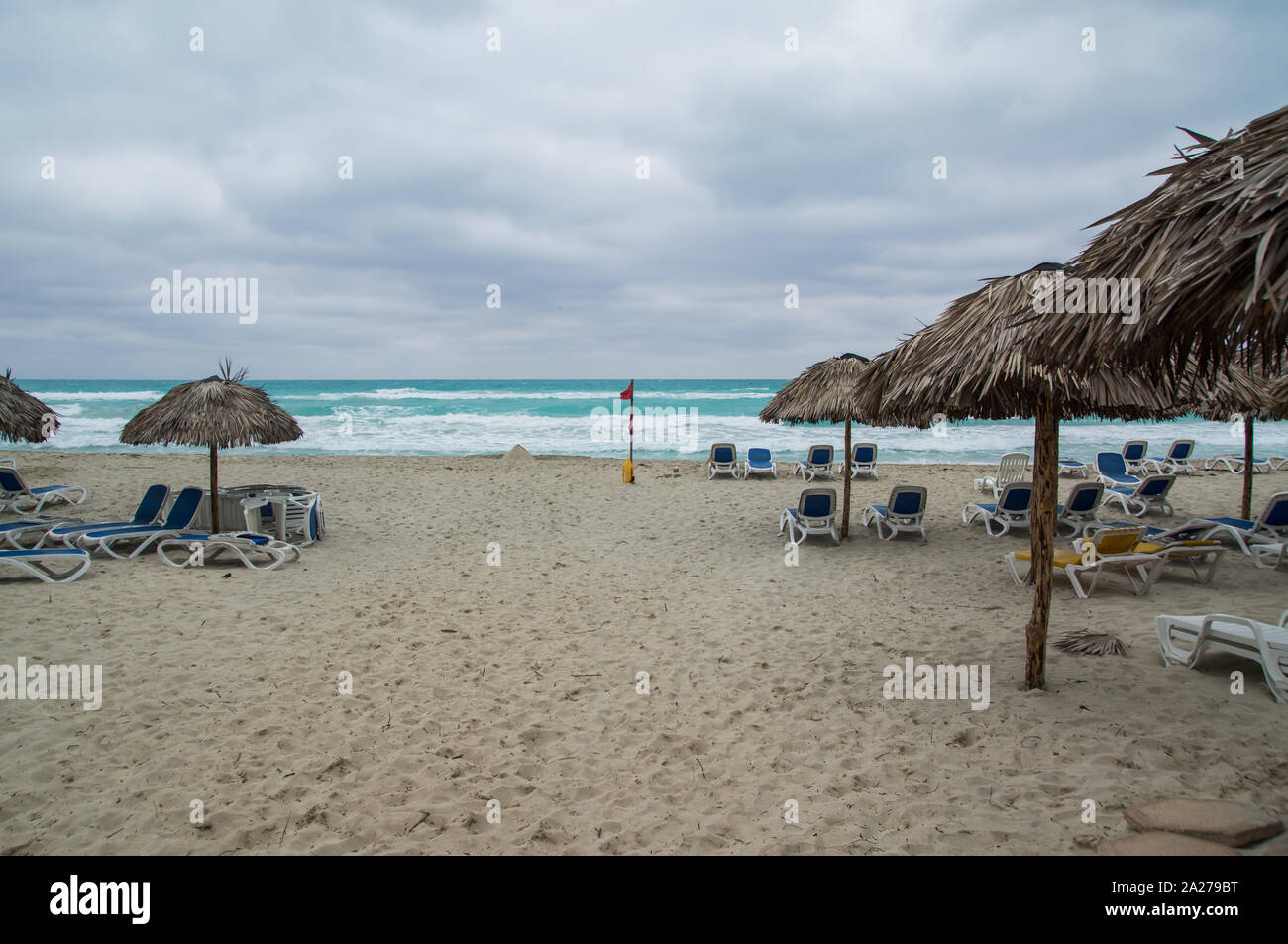 Deserted Cuban beach in bad weather, dark clouds over the sea Stock ...