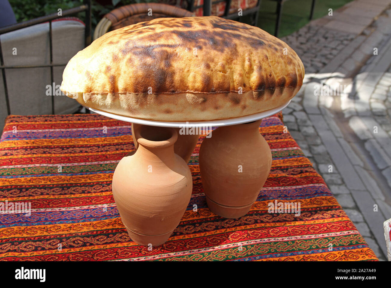 Traditional turkish bread loaf on table in a coffe shop restaurant ...
