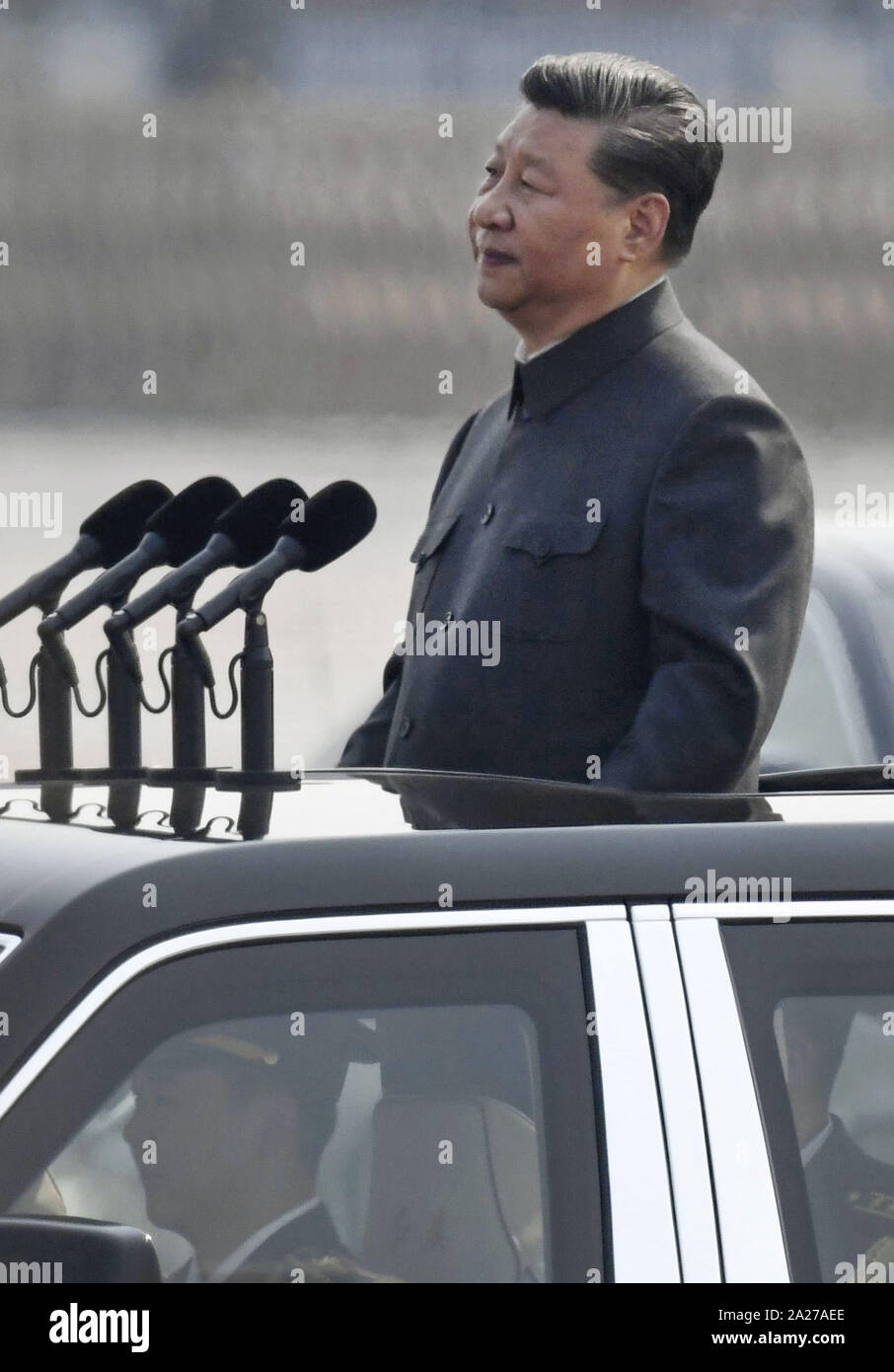 Beijing, China. 1st October, 2019. Chinese President Xi Jinping stands ...