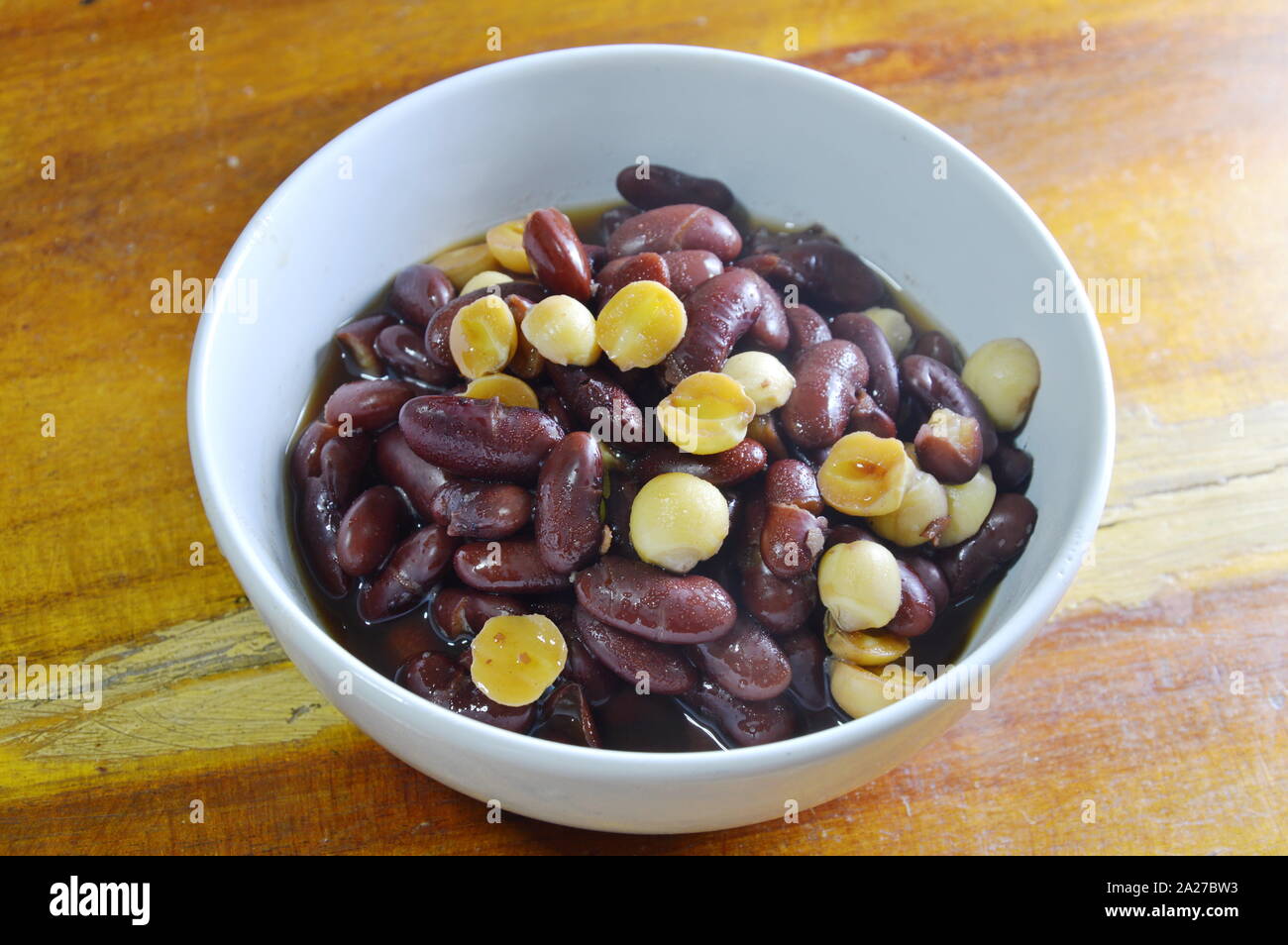 boiled hot red bean and lotus seed in syrup on bowl Stock Photo - Alamy