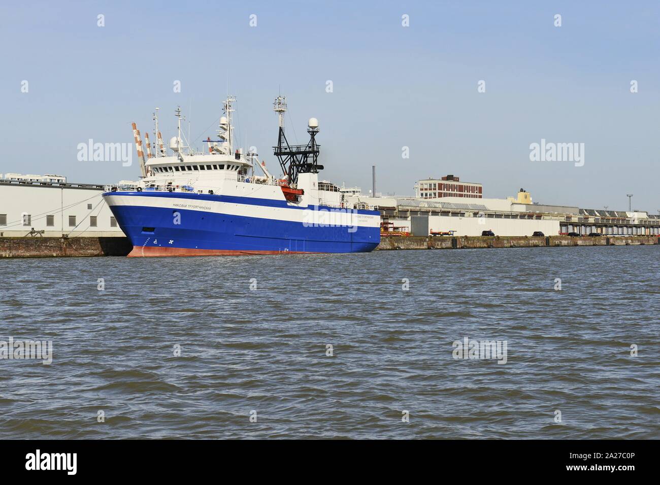 Blue and white Russian research vessel in the conjunction harbour from ...