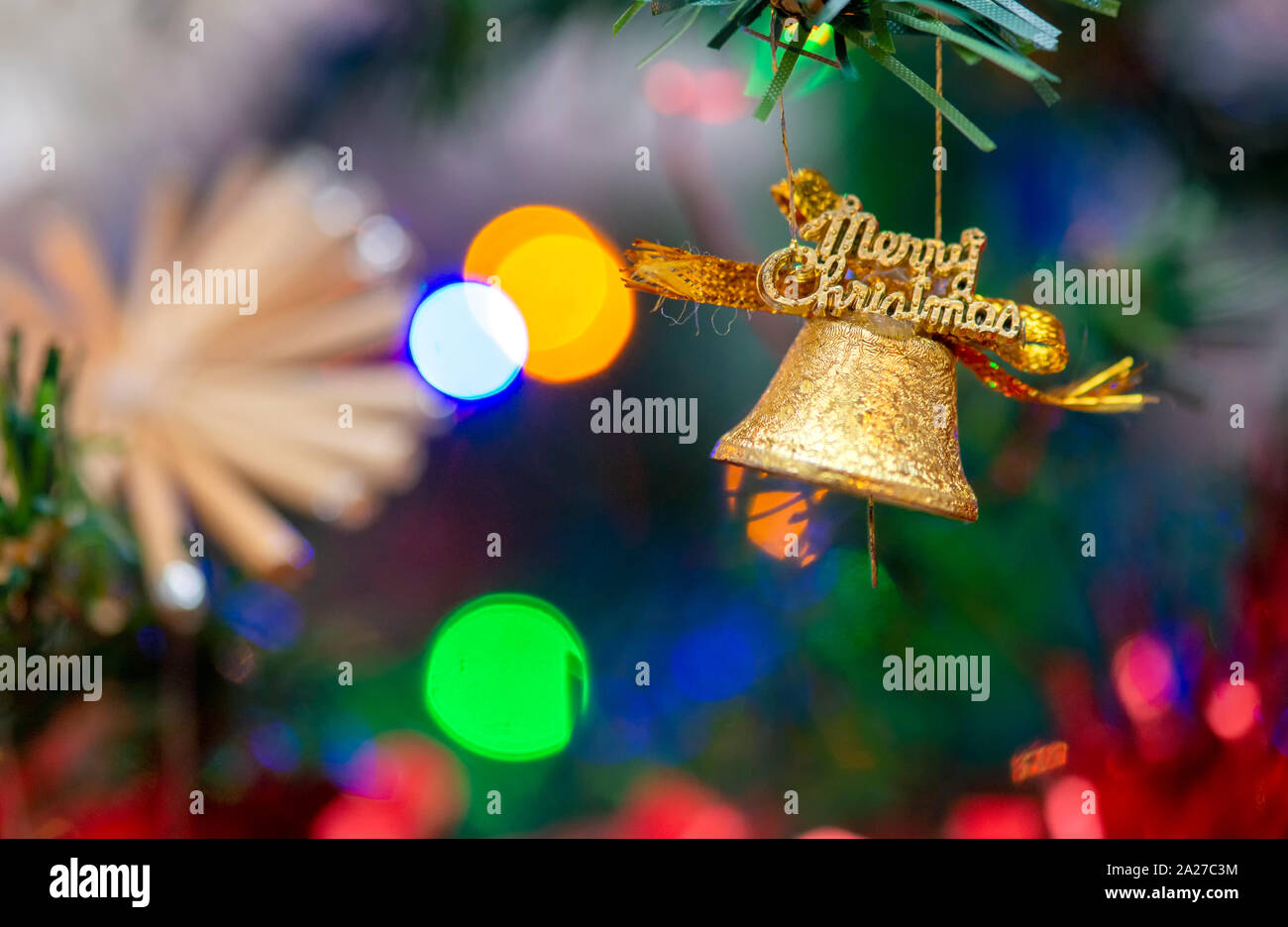 Bell decoration on traditional Christmas tree Stock Photo - Alamy