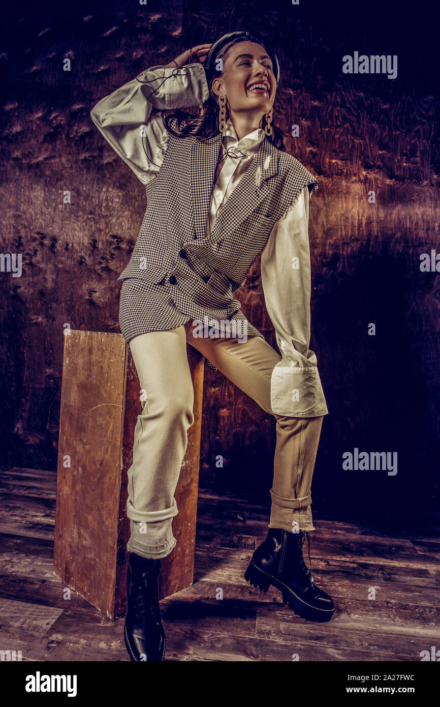 Happy beautiful lady modelling striking poses Stock Photo - Alamy