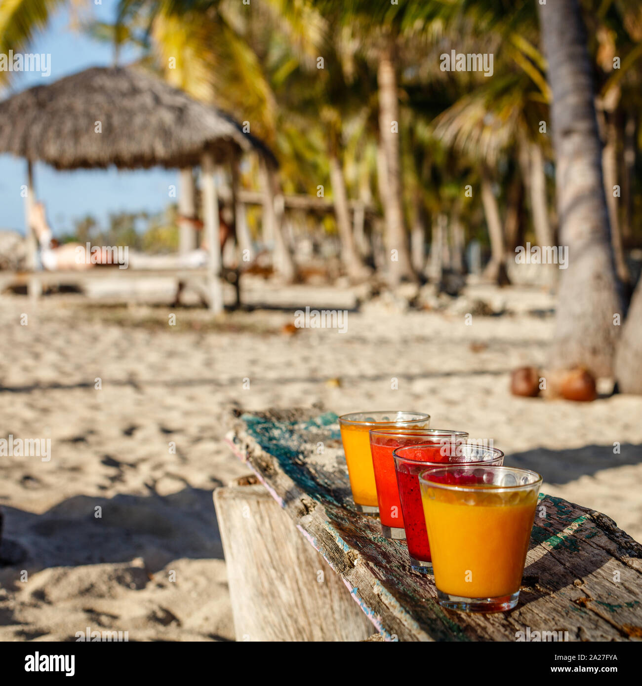 Mango, dragon fruit, watermelon and papaya fresh juices on the beach ...