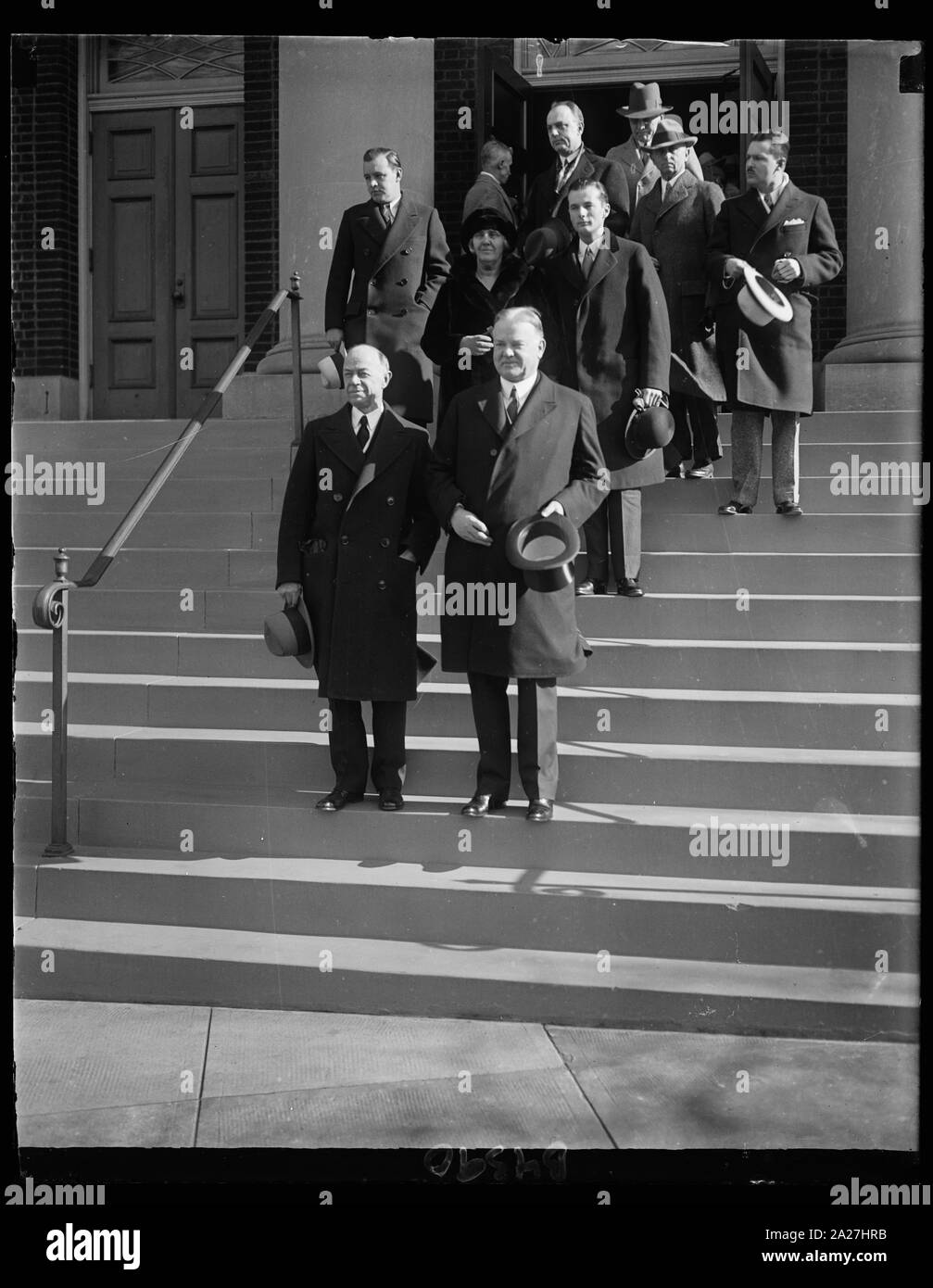 Pres. Hoover, Rev. Taylor, Mrs. Hoover, and Allen Hoover leaving church ...