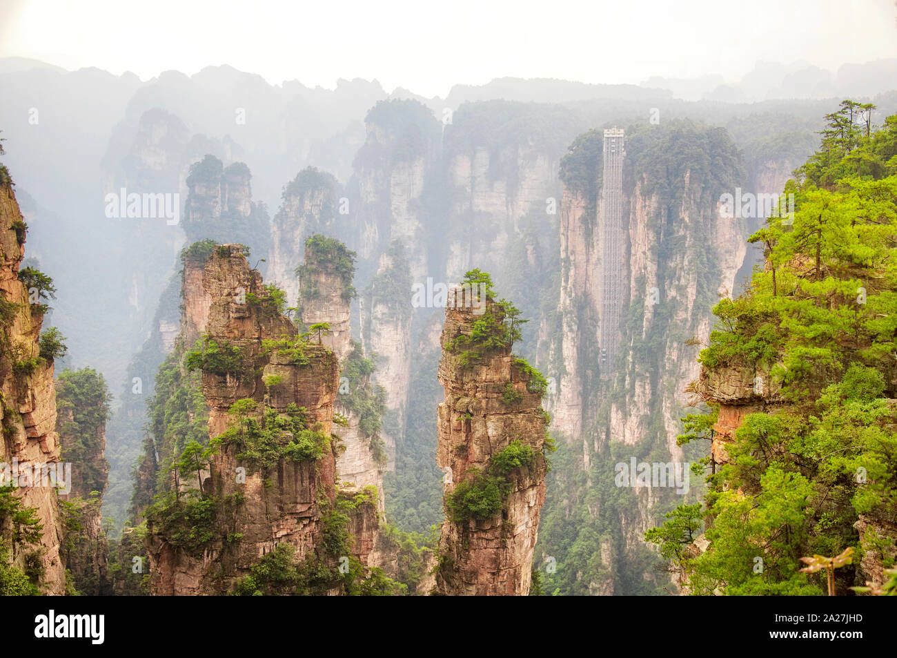 The landmark elevator and unusual rock formations within the geopark ...