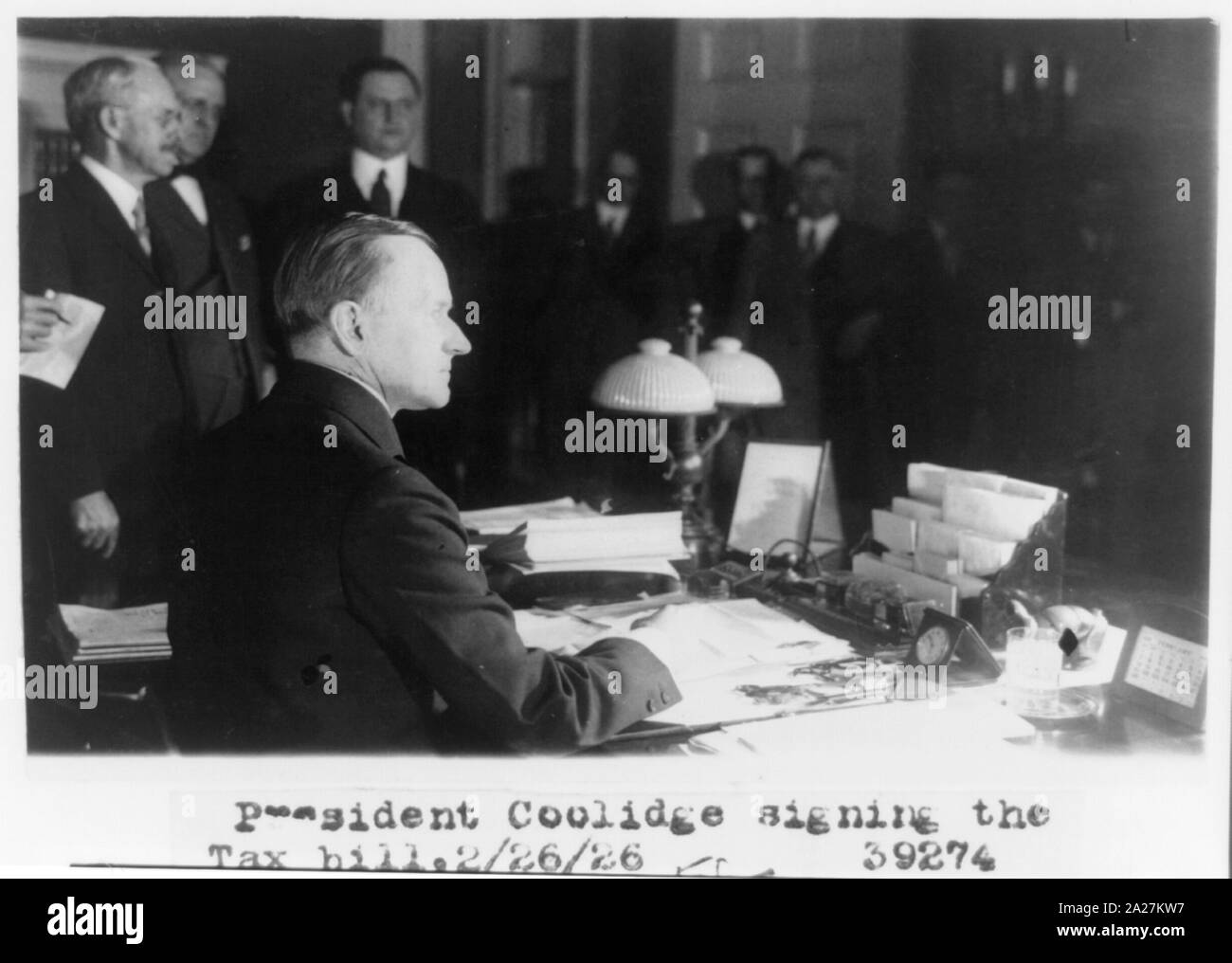 President Coolidge signing the tax bill Stock Photo - Alamy