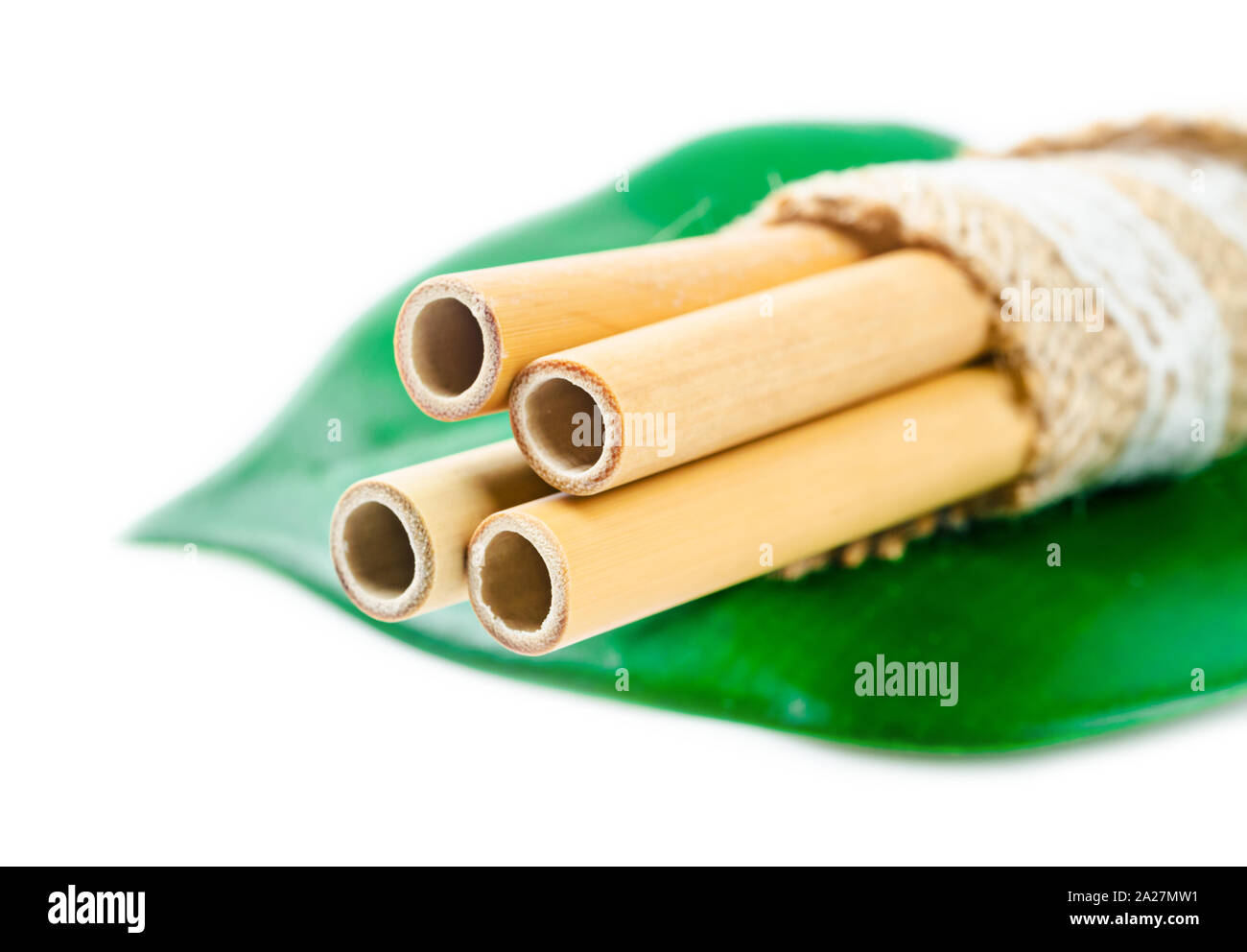 Ecological bamboo straws tube for drinking water on white background ...