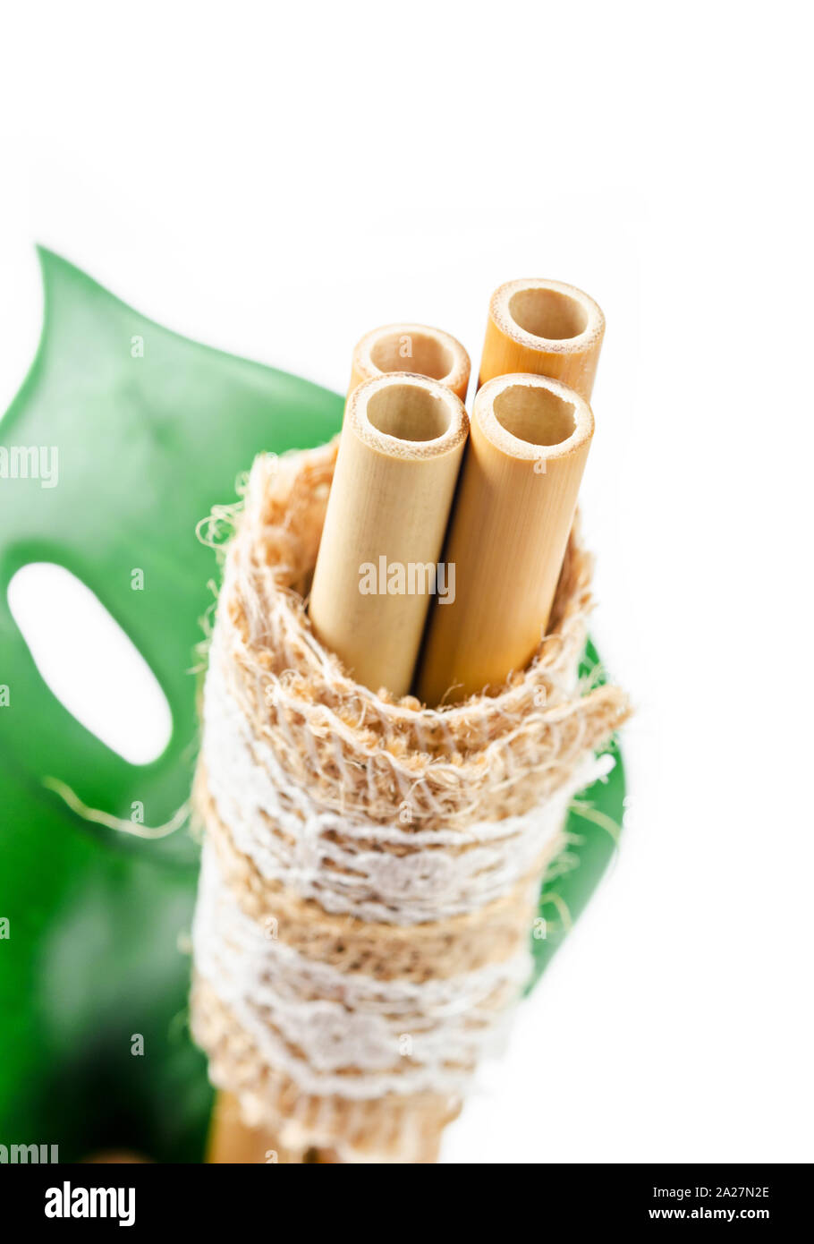 Ecological bamboo straws tube for drinking water on white background ...