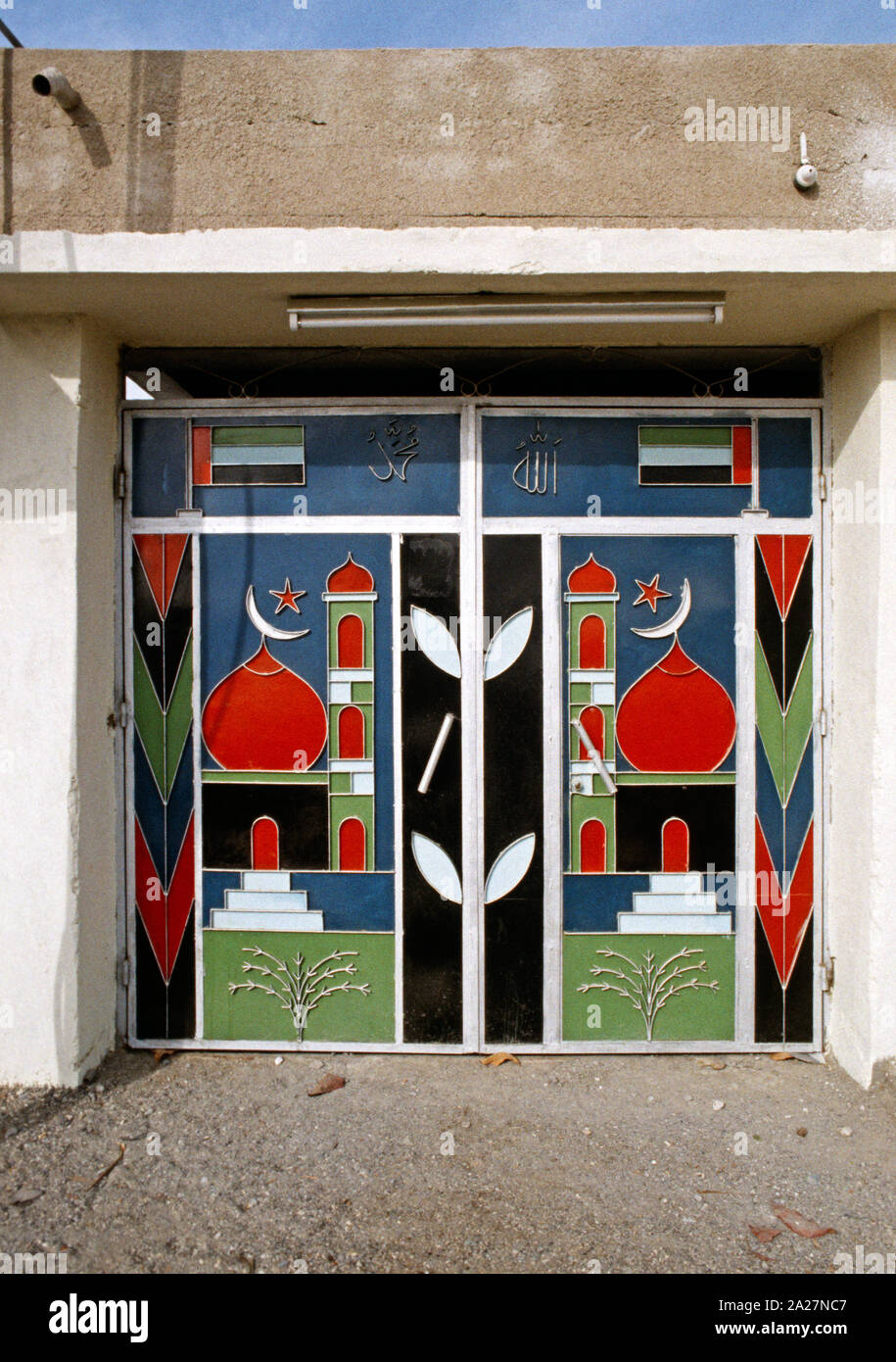 Courtyard entrance painted metal doors, Dubai, United Arab Emirates ...