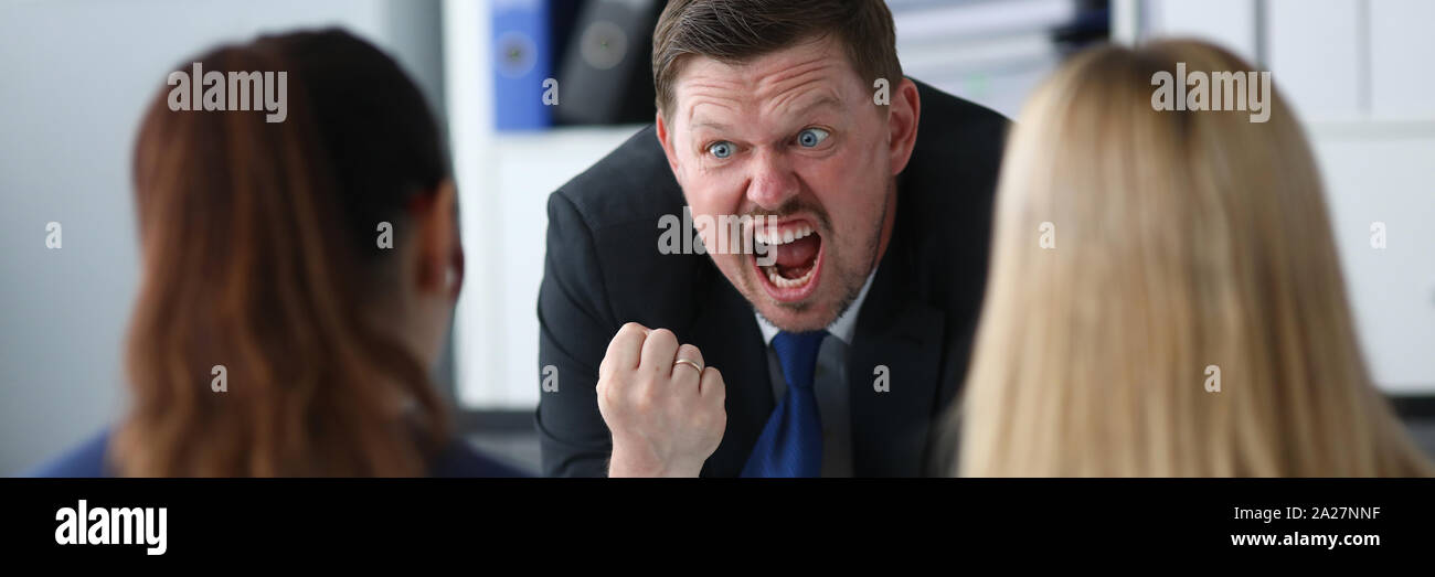 Angry shouting manager Stock Photo - Alamy