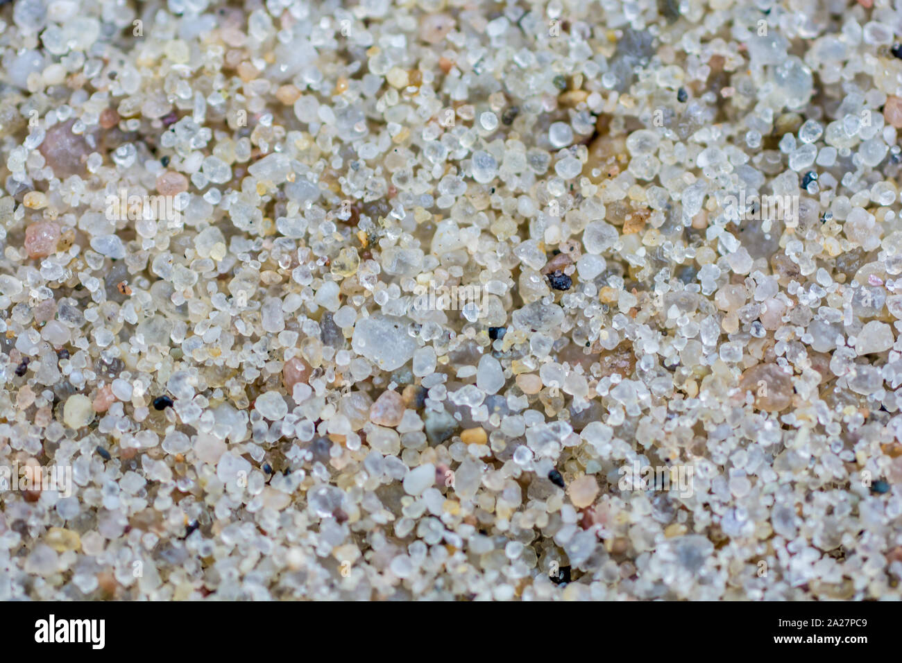 Grains of sand as a detailed background Stock Photo - Alamy