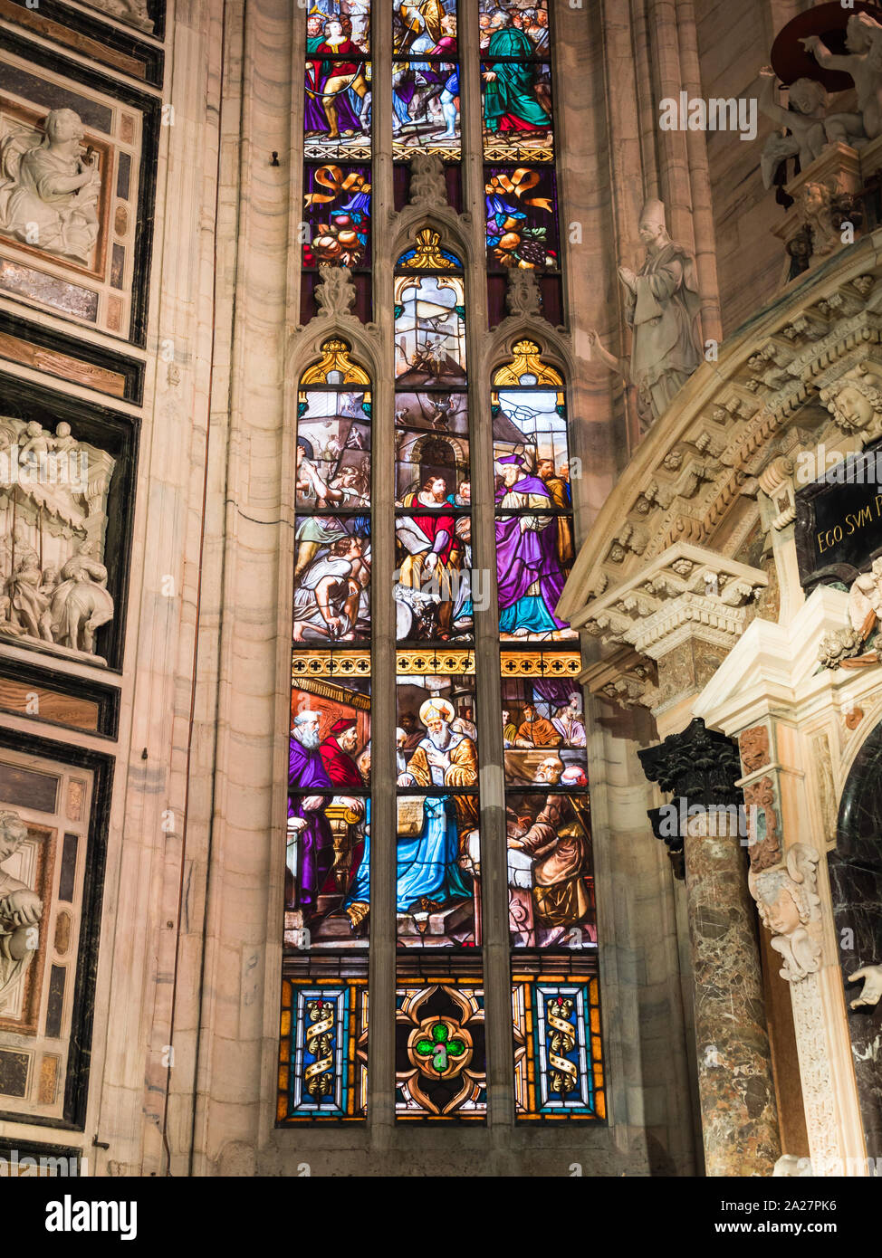 stained glass window of Milan Catehdral in Italy Stock Photo - Alamy