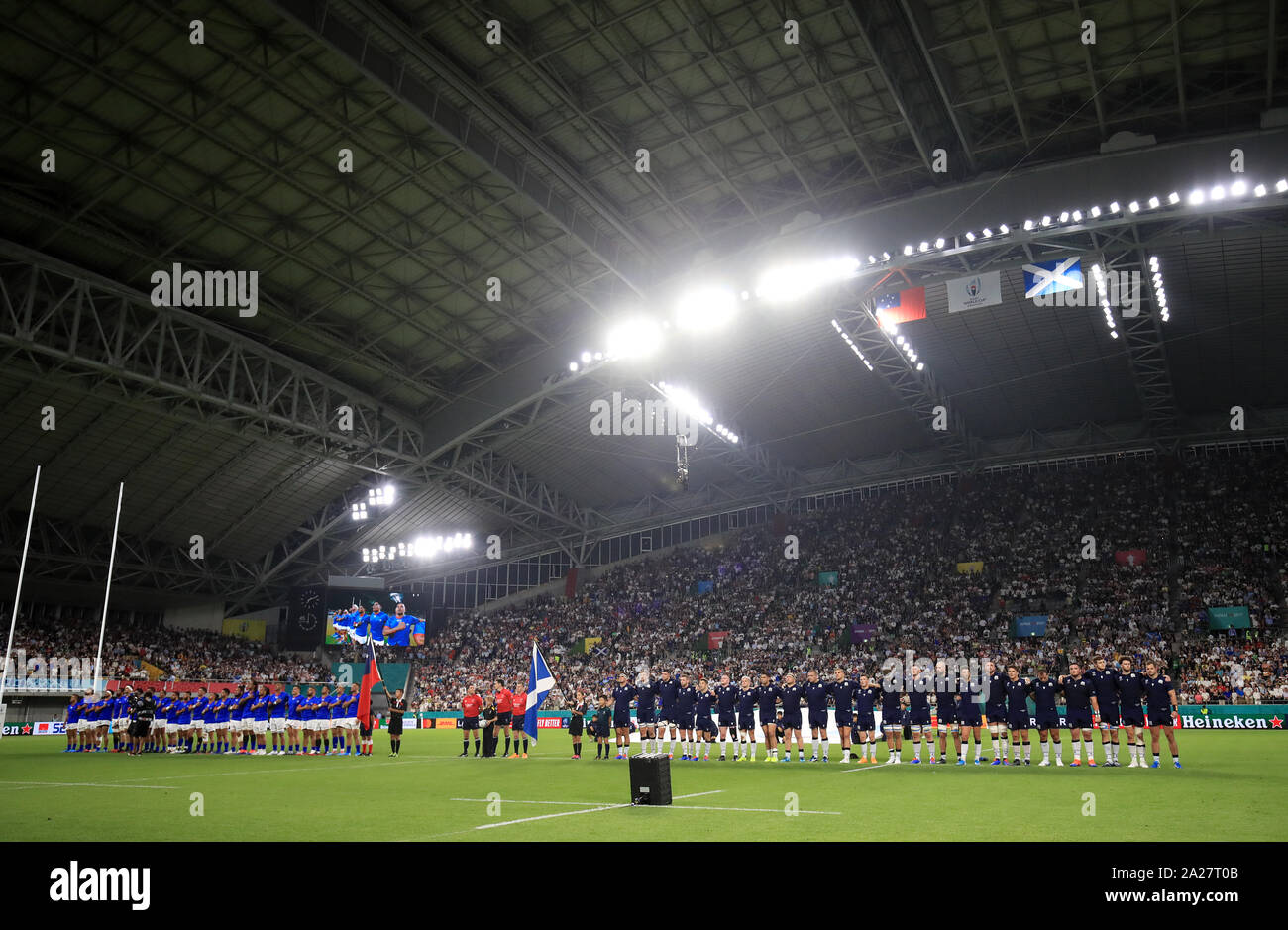 Samoa players and Scotland players line up before kick off Stock Photo ...