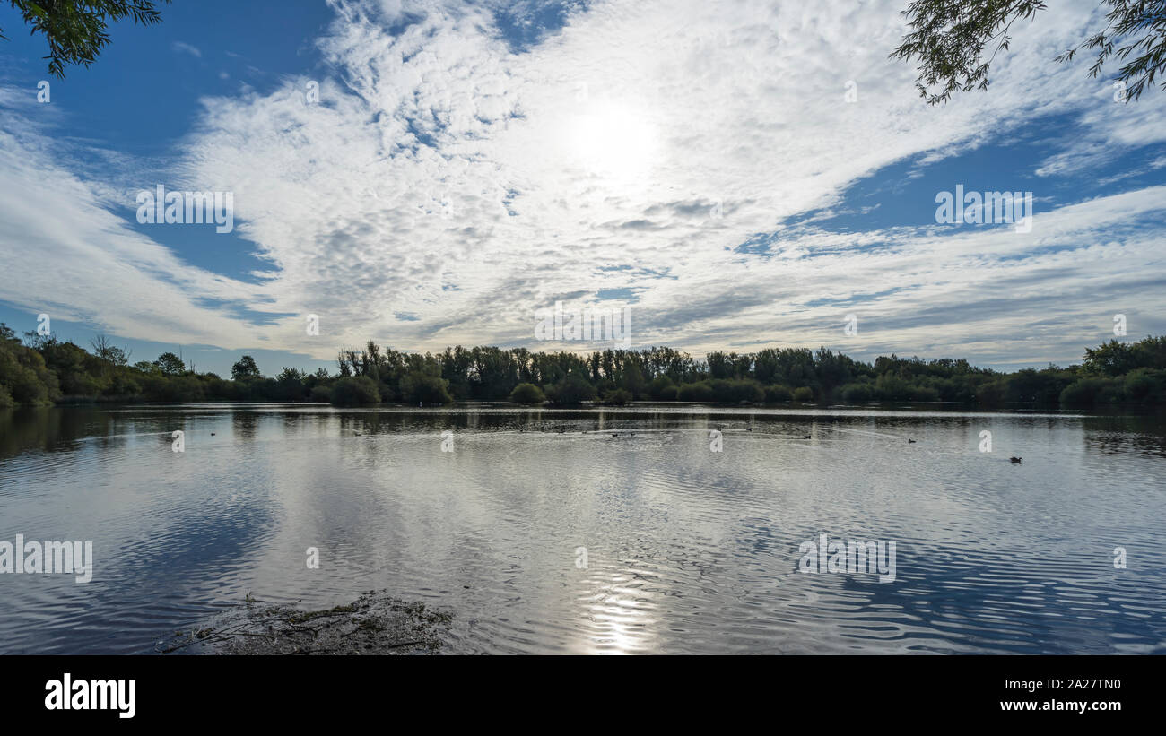 lake and sky reflection Stock Photo - Alamy