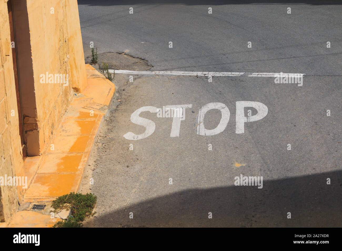 STOP Pavement Marking on street in Malta, Gozo island, Left-hand ...