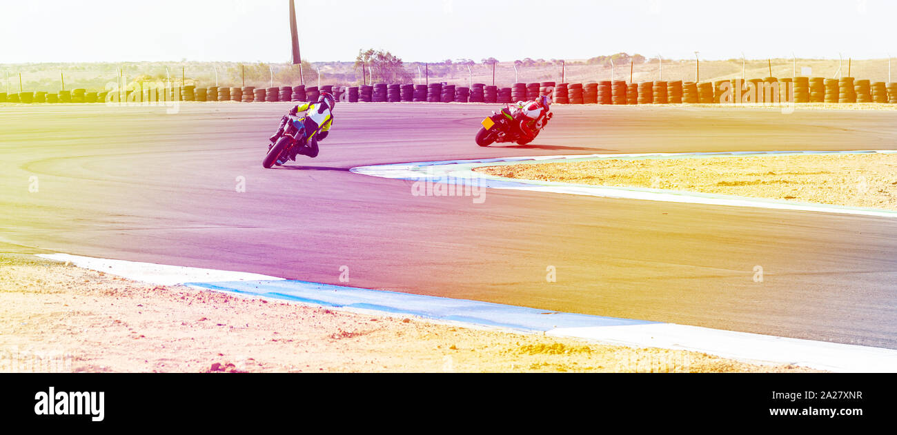 competition, motorcycle racer rides on a sports track Stock Photo - Alamy
