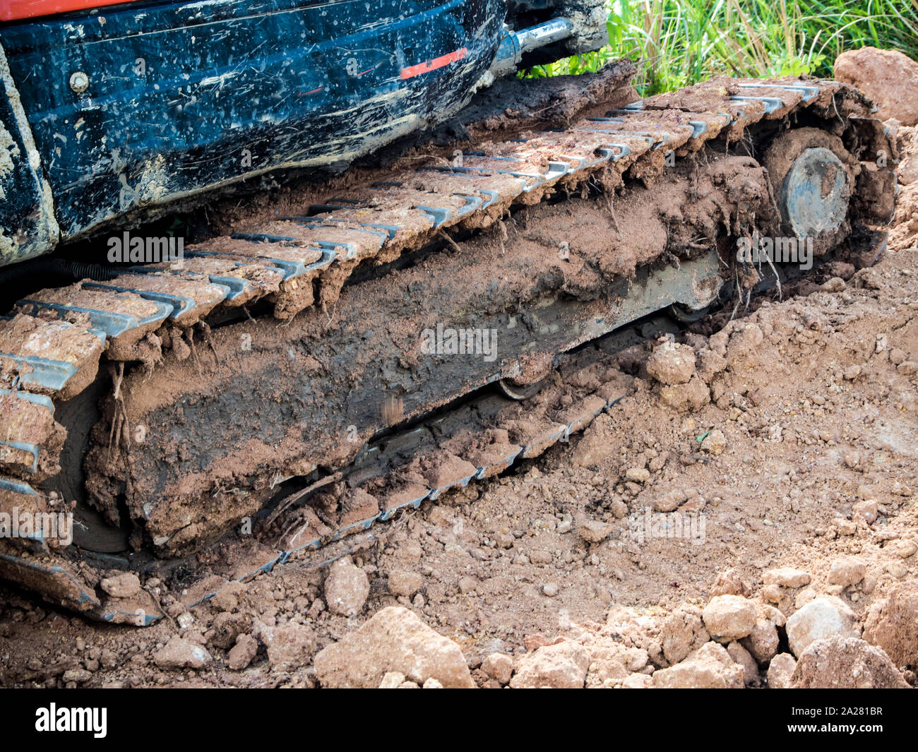 Tracked vehicle working in farm Stock Photo - Alamy