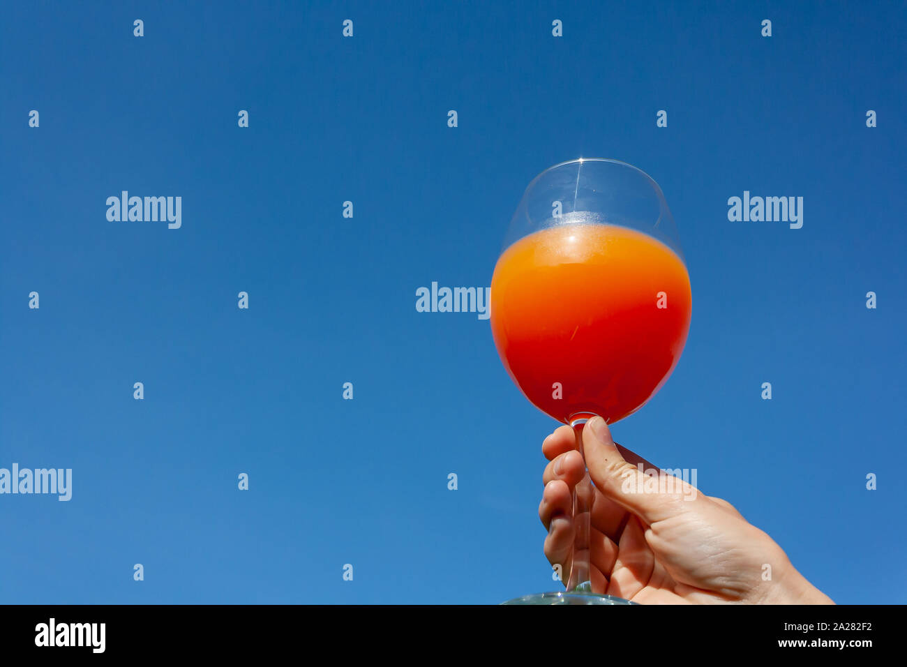 Veneziano an Italian wine-based cocktail on a blue sky background Stock ...