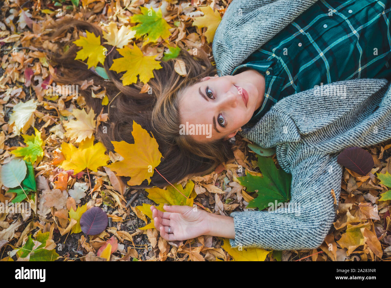 Caucasian woman laying on the ground hi-res stock photography and ...