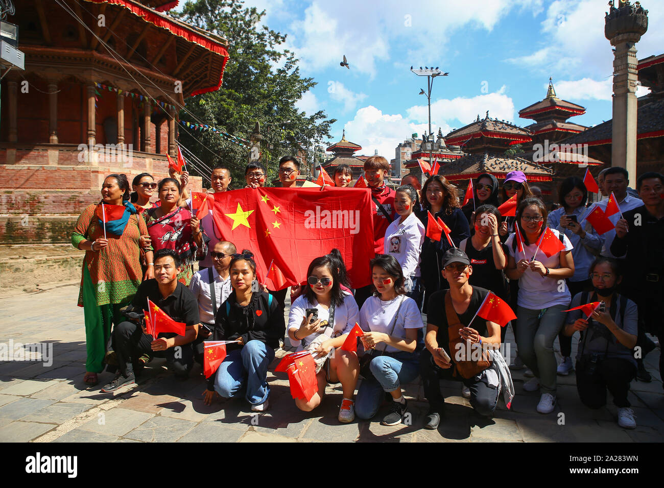 Kathmandu, Nepal. 01st Oct, 2019. Chinese people pose for a photo while ...