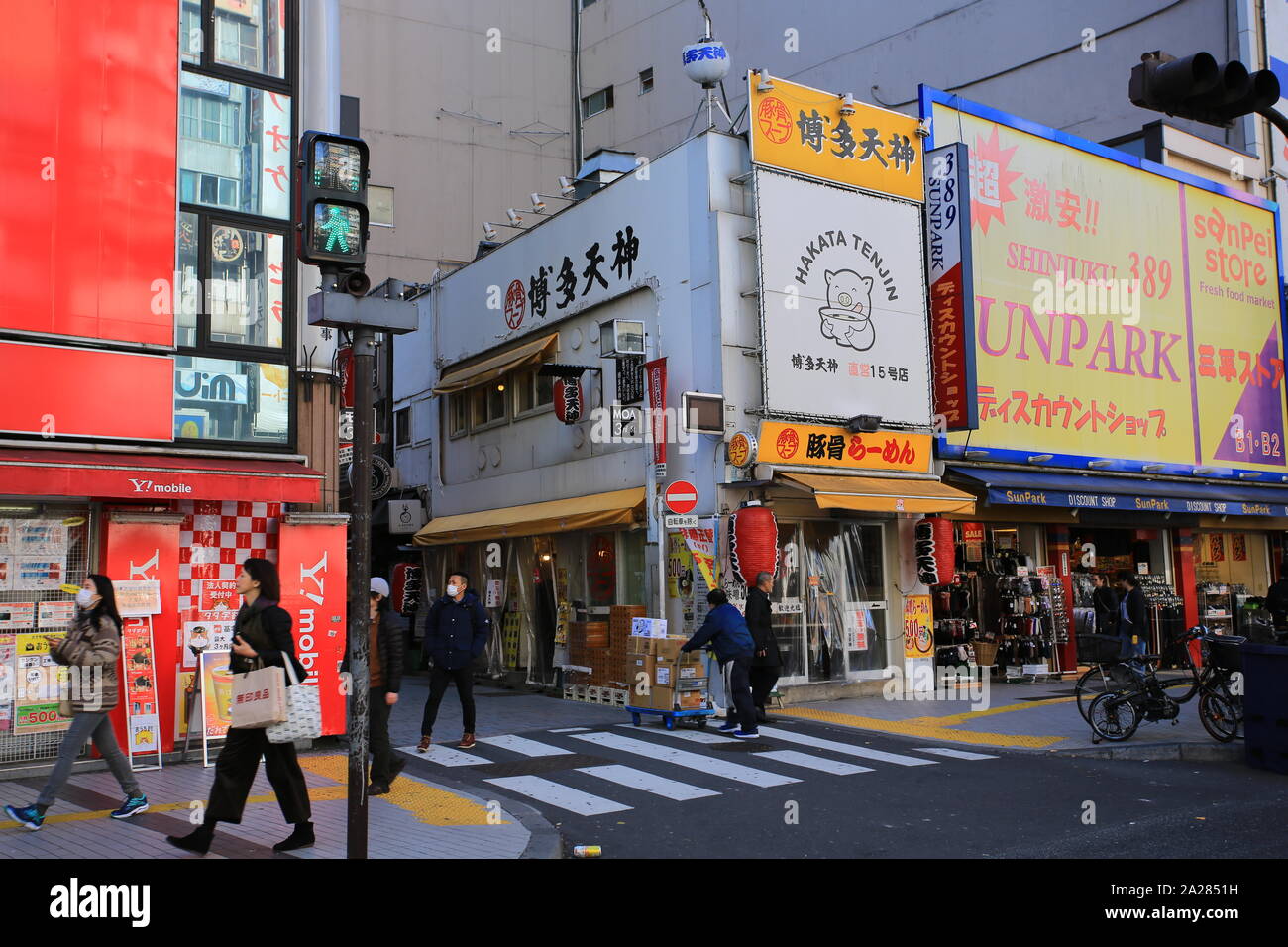japanese cross the road on Shibuya street. Shibuya is one of the famous ...