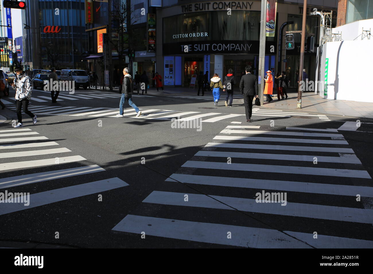 Tokyo/Japan- January 14 2018: japanese cross the road on Shibuya street ...