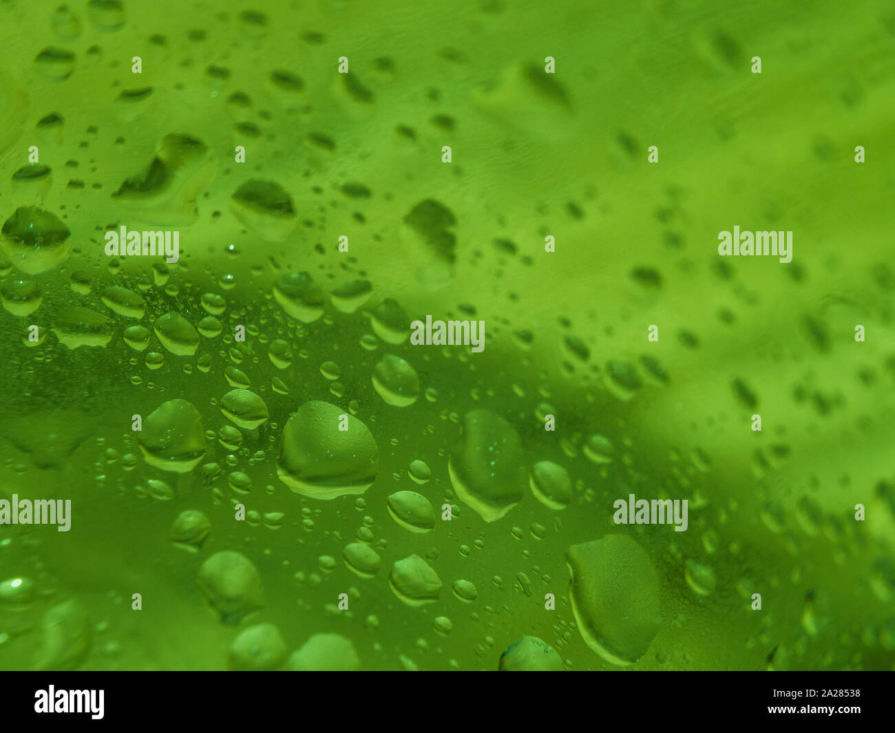Drop background in green Stock Photo - Alamy