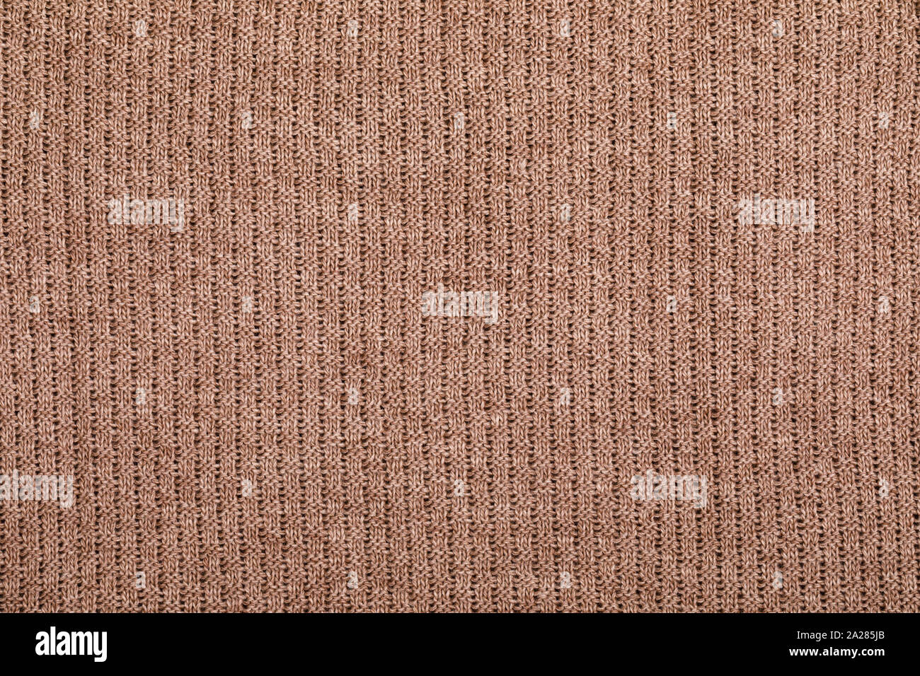 Brown knitted fabric hi-res stock photography and images - Alamy