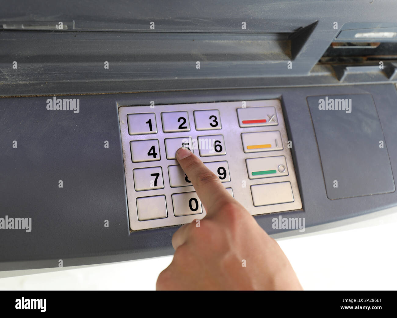 kypad with numbers at ATM Machine and the hand Stock Photo - Alamy