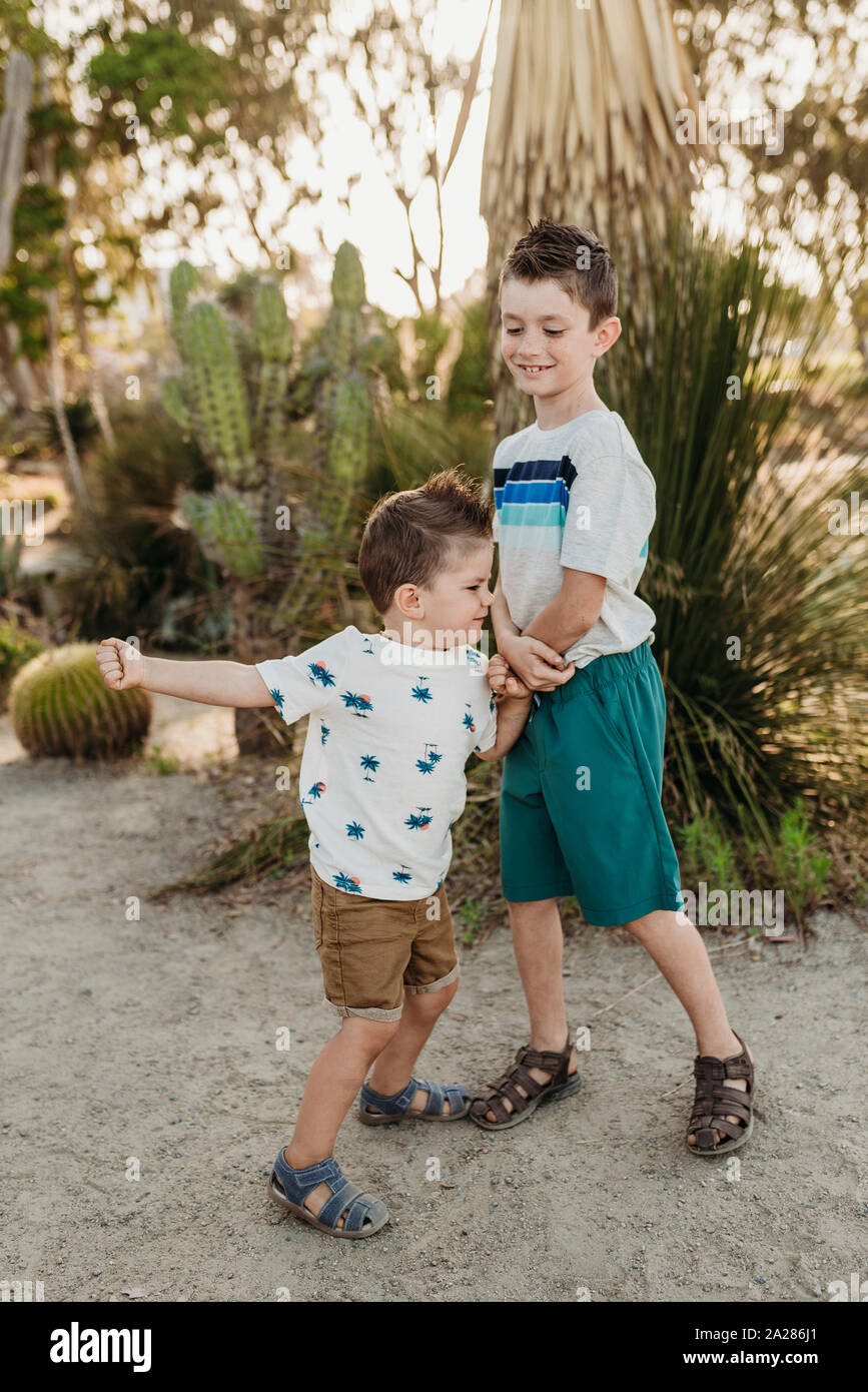 Sibling rivalry toddler hi-res stock photography and images - Alamy