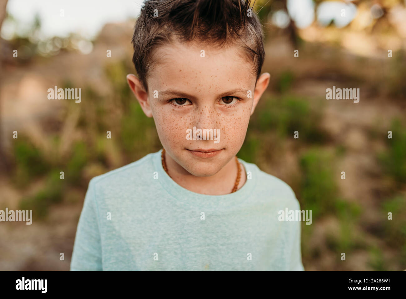 Serious portrait of kindergarten aged boy staring seriously Stock Photo ...