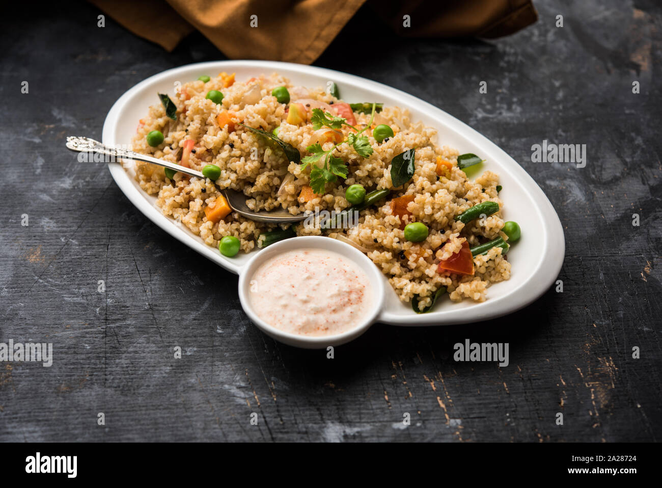 Broken wheat upma hi-res stock photography and images - Alamy