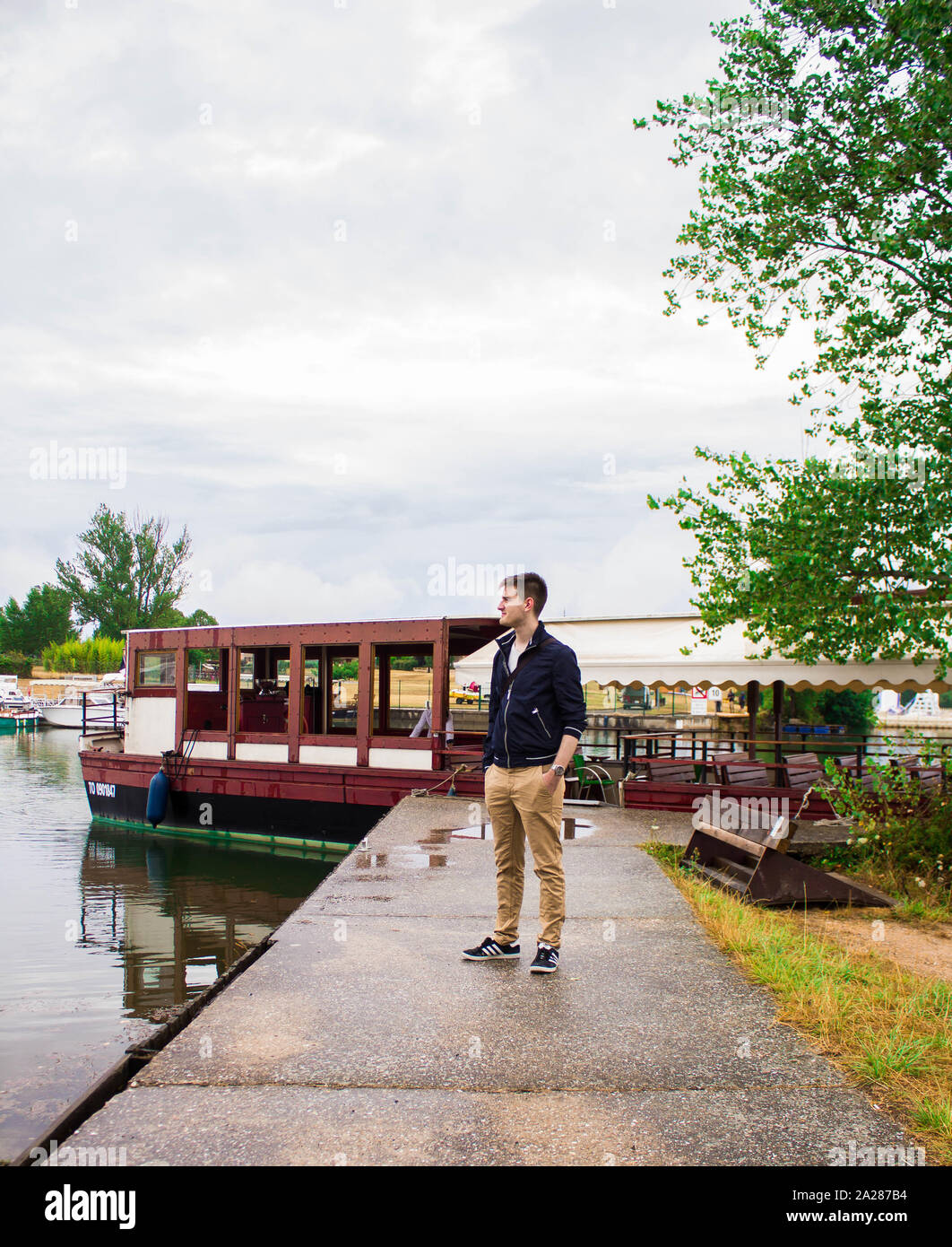 Boy on canal boat hi-res stock photography and images - Alamy