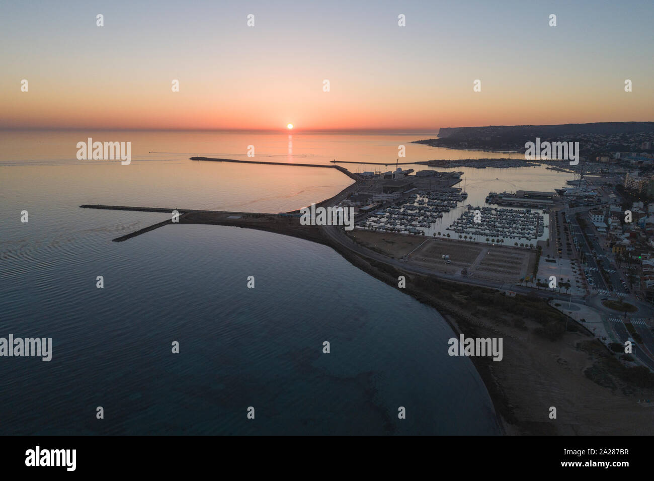 Denia city view from the air at sunset Stock Photo - Alamy