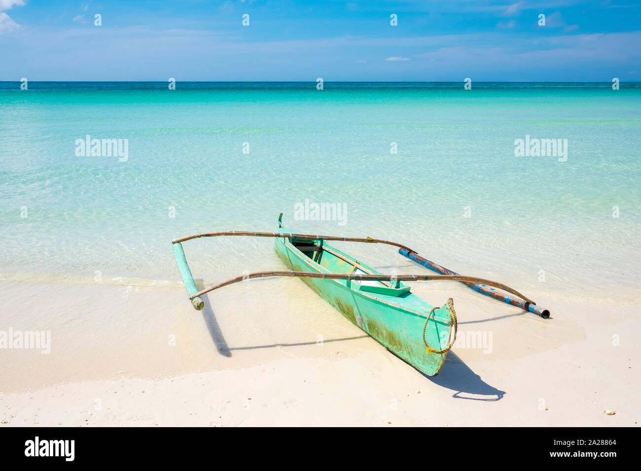Small bangka outrigger boat on White Beach, Boracay Island, Aklan ...