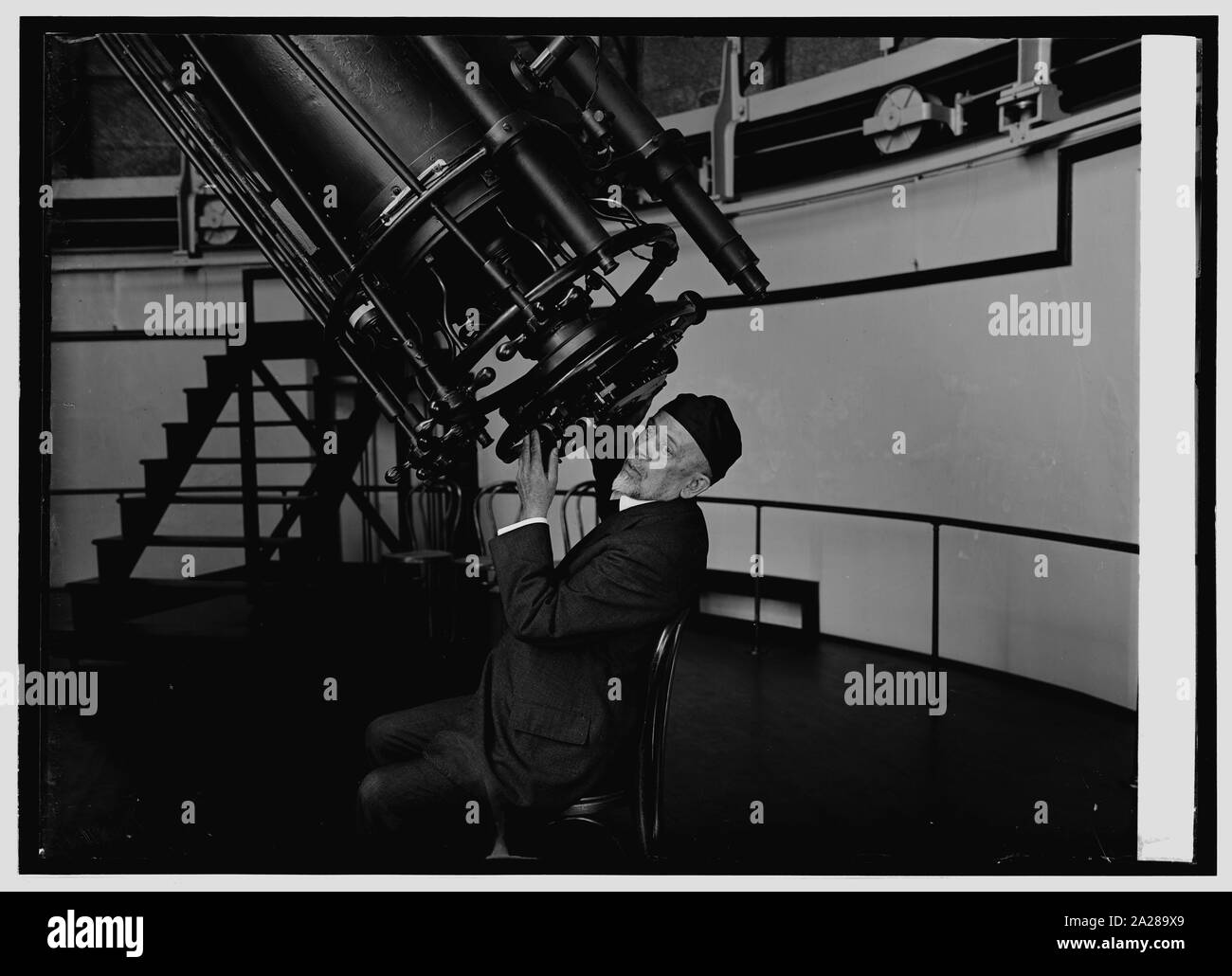 Prof. Hall of Naval Observatory with 26 inch telescope, Washington, D.C ...