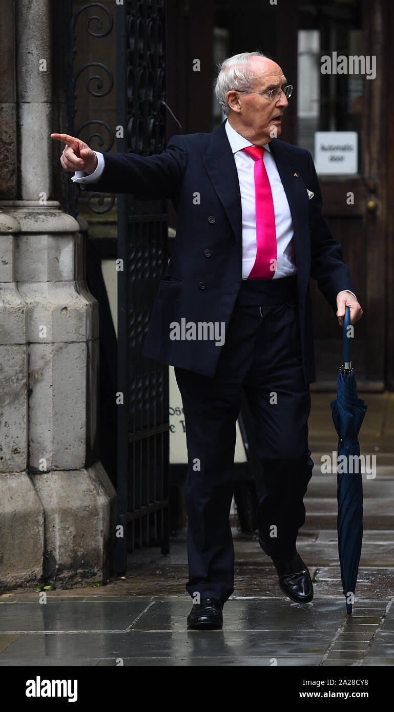 Sir Frederick Barclay (left) leaves the High Court in London, follow a ...