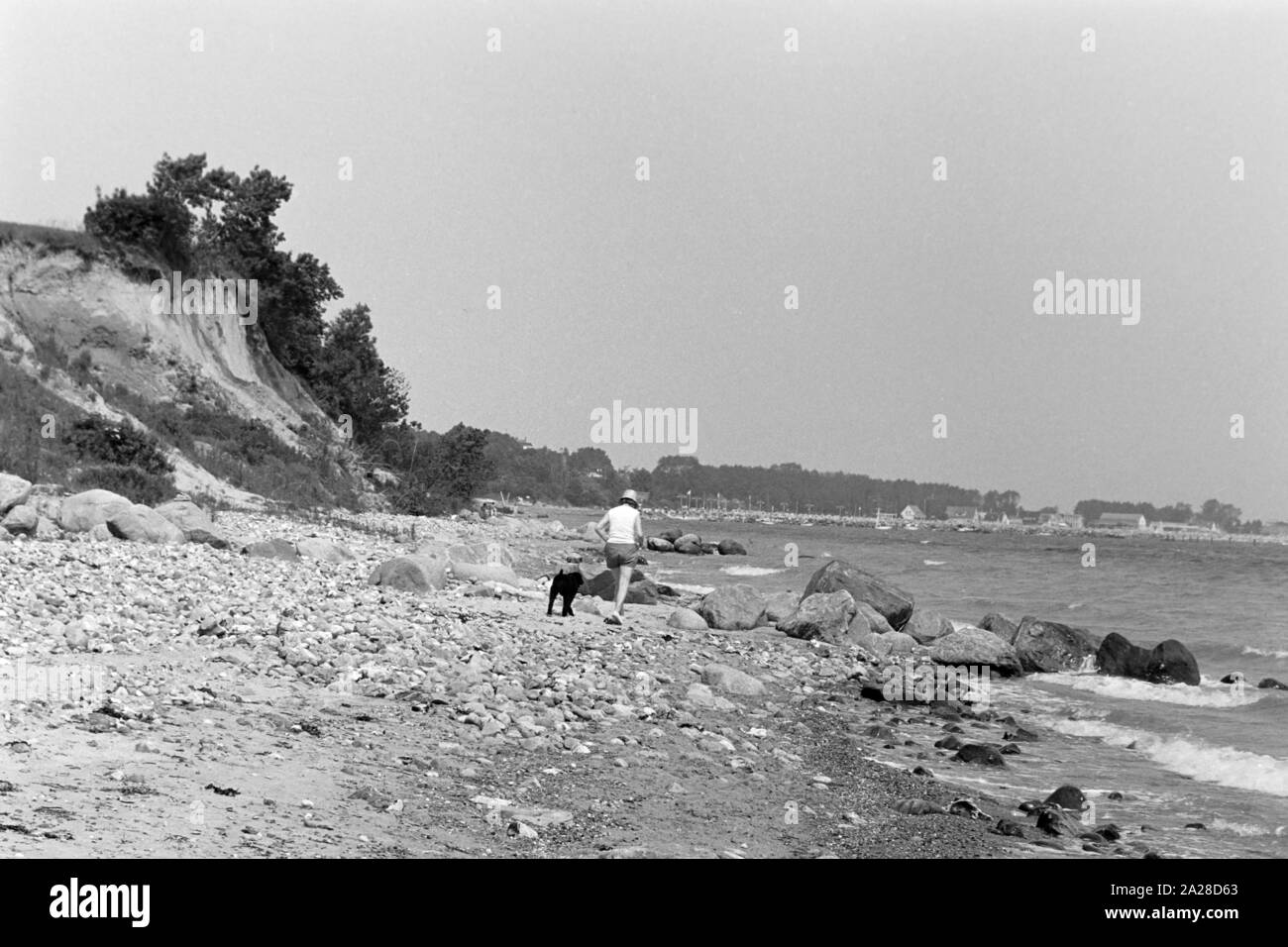Sommerferien am Strand der Nordsee, Deutschland 1960er Jahre. Holidays ...