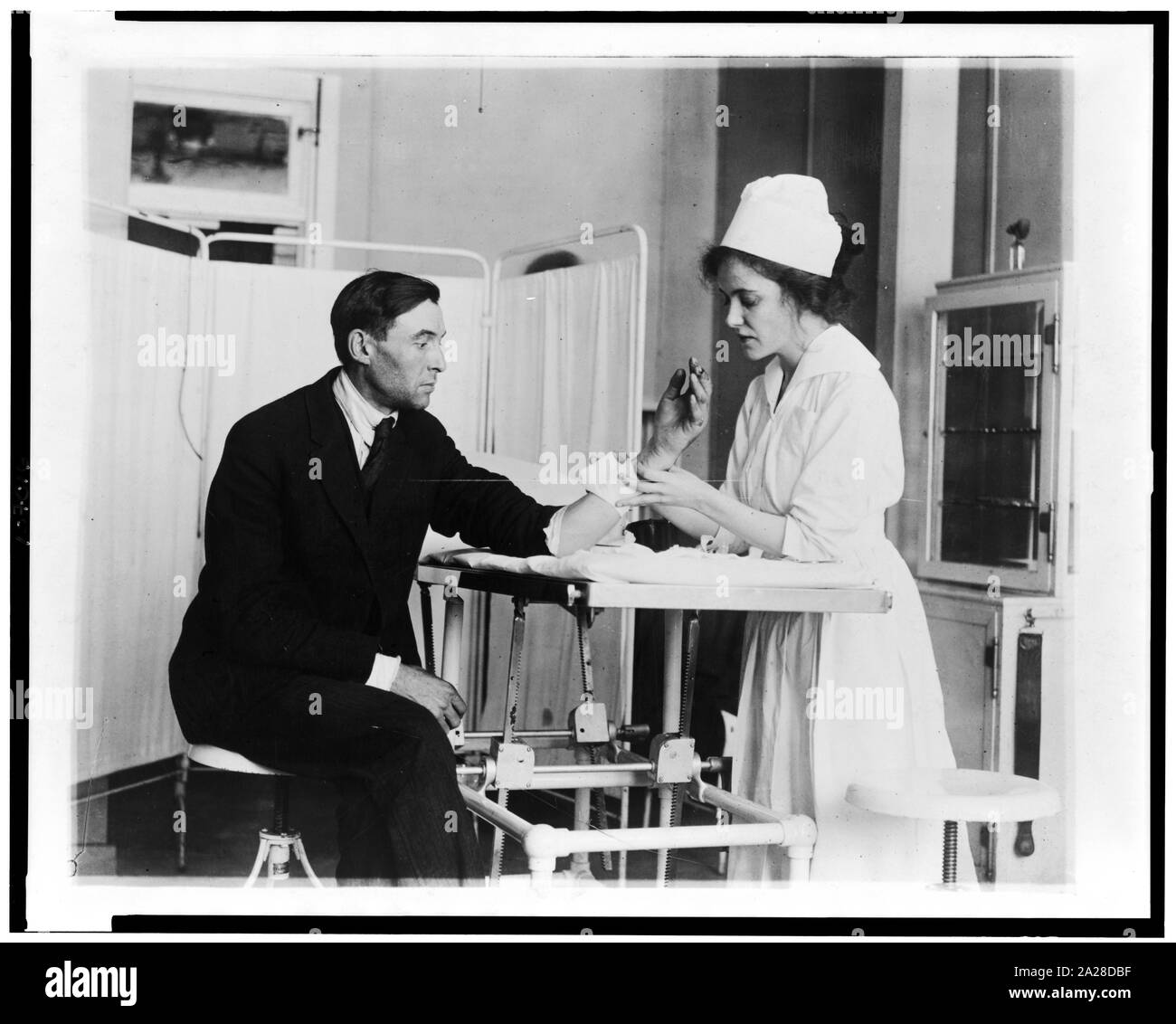 Public Health Service nurse treating patient Stock Photo - Alamy