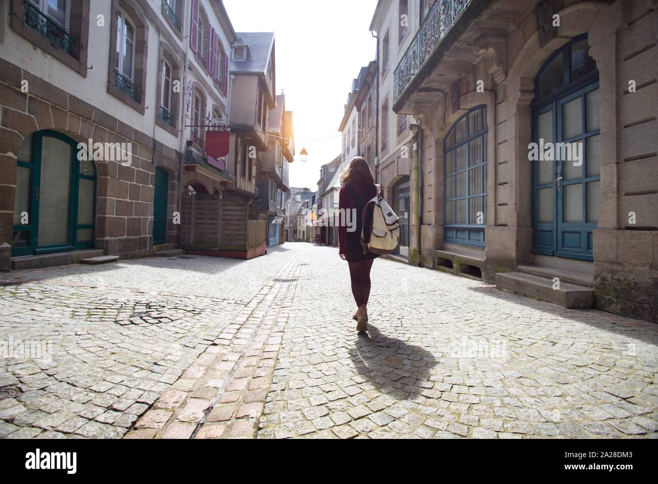 Girl walking empty street in hi-res stock photography and images - Alamy