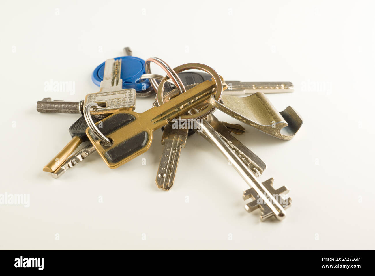 large bunch of different keys isolated on a white background Stock ...