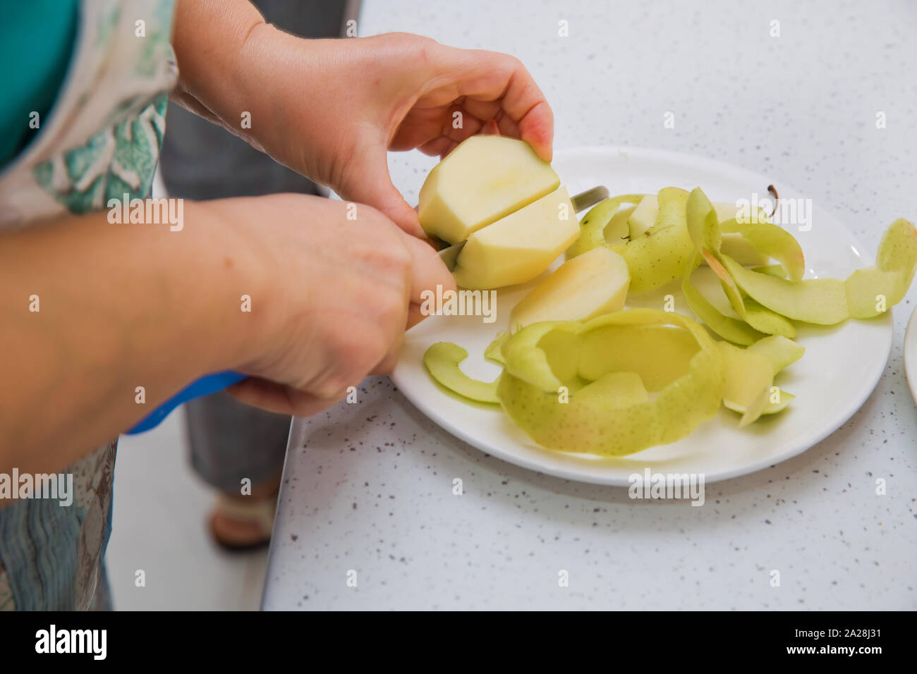 Peeling off with knife hi-res stock photography and images - Alamy