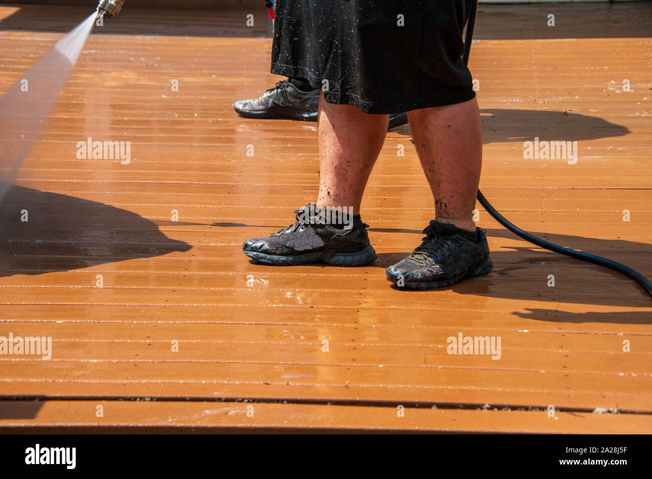 Black man pressure washing hi-res stock photography and images - Alamy