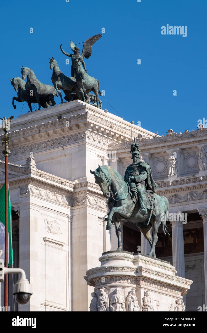 Wonderful statuary and flying Italian flags on the huge grand marble ...